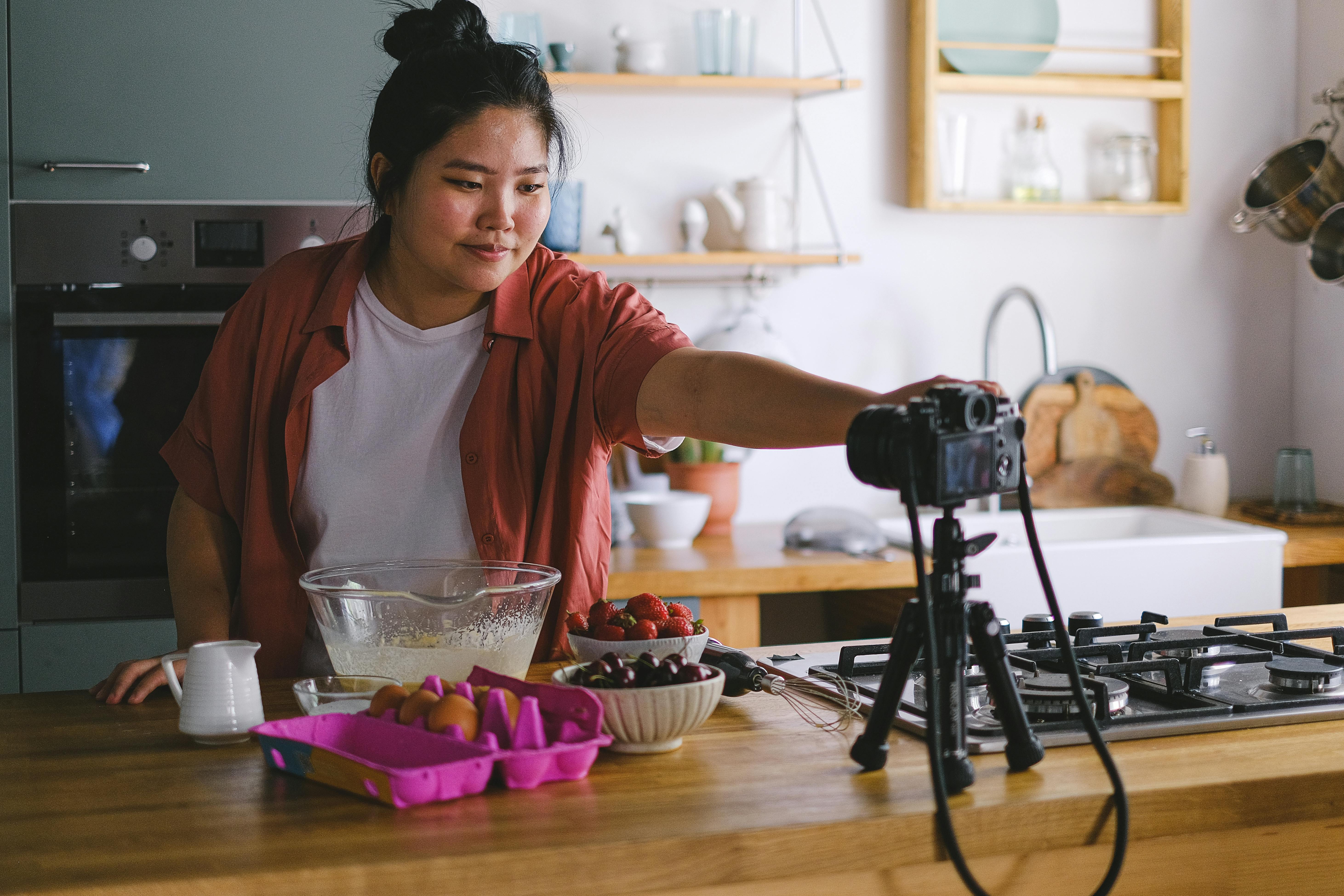 Woman Filming a Cooking Vlog · Free Stock Photo