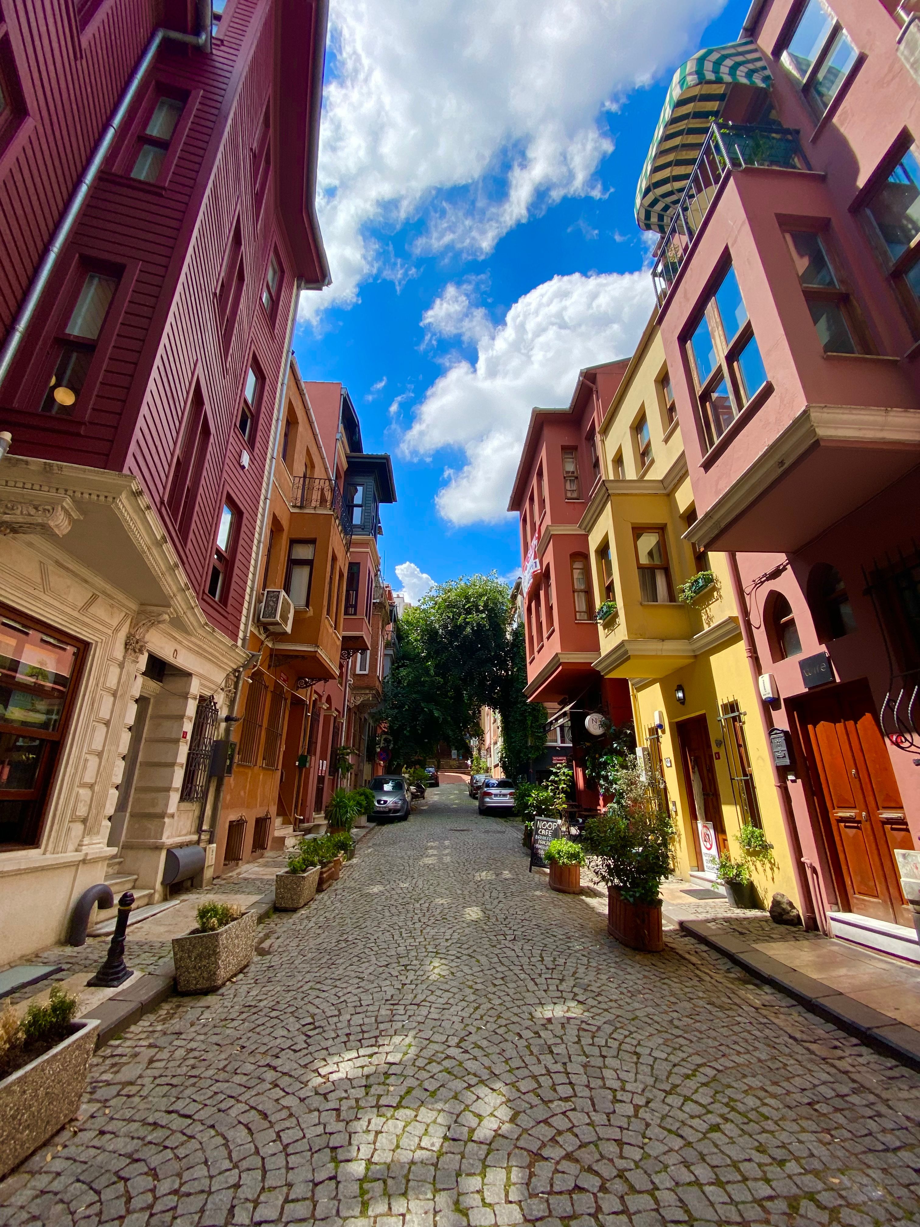 A Street in a City with a Cobblestone Pavement · Free Stock Photo