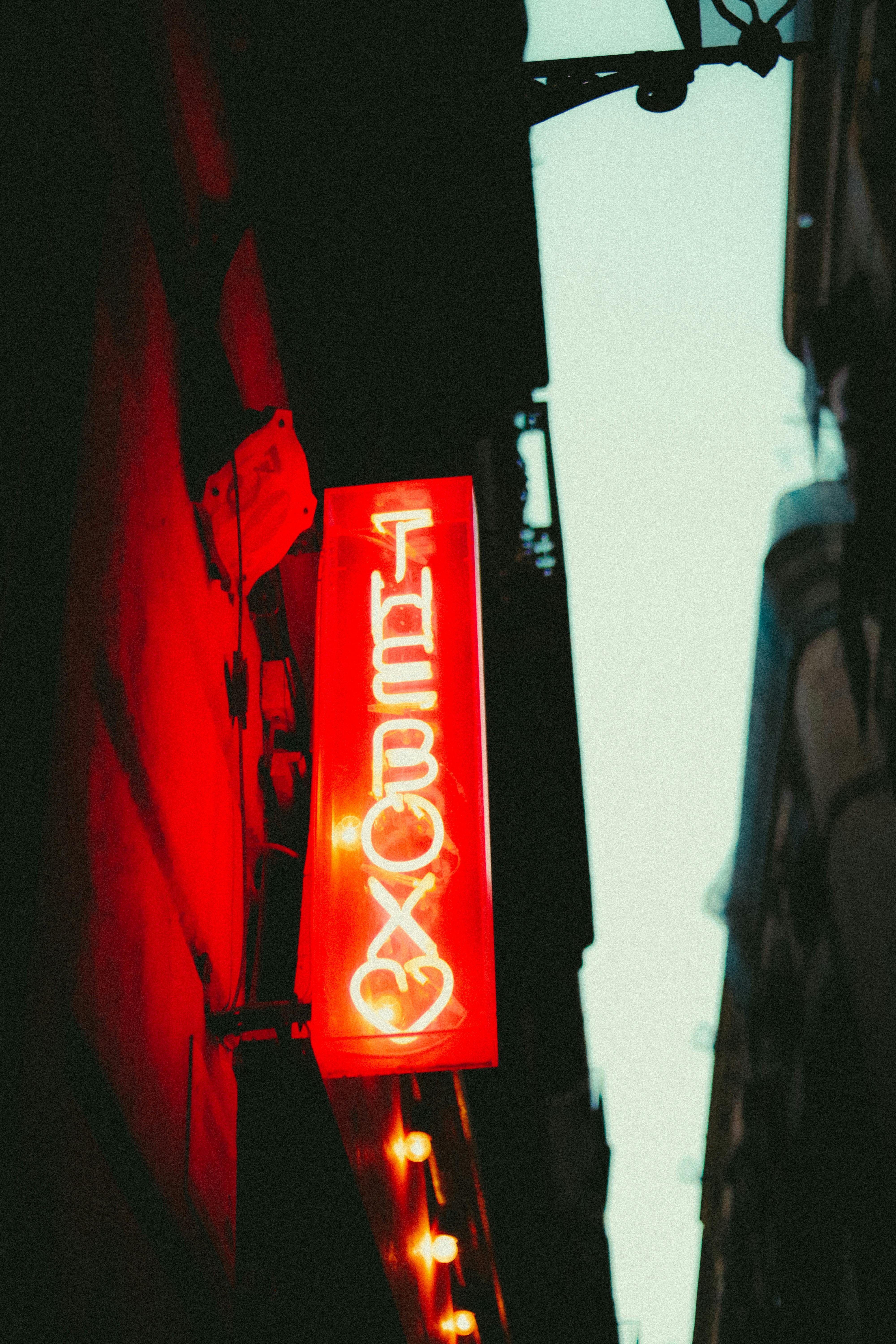 Red Glowing Neon Sign · Free Stock Photo