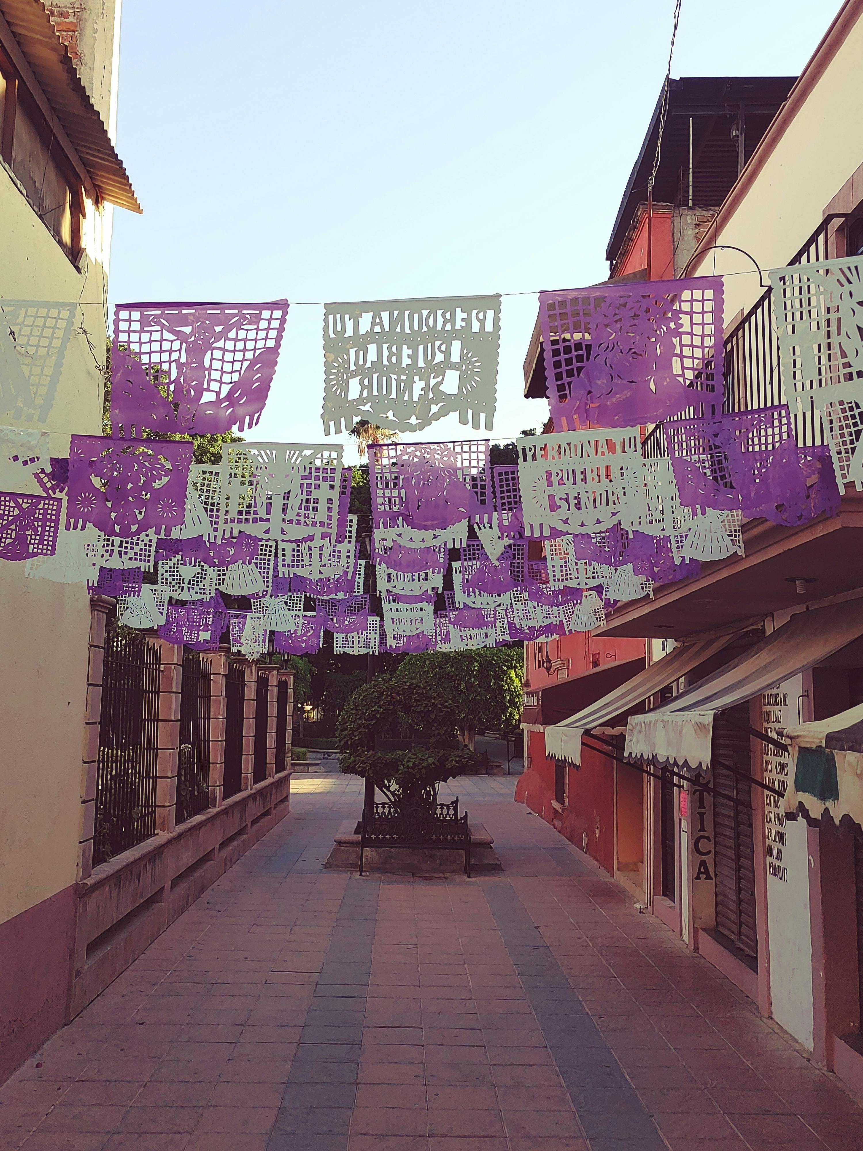 Decorations on an Alleyway · Free Stock Photo