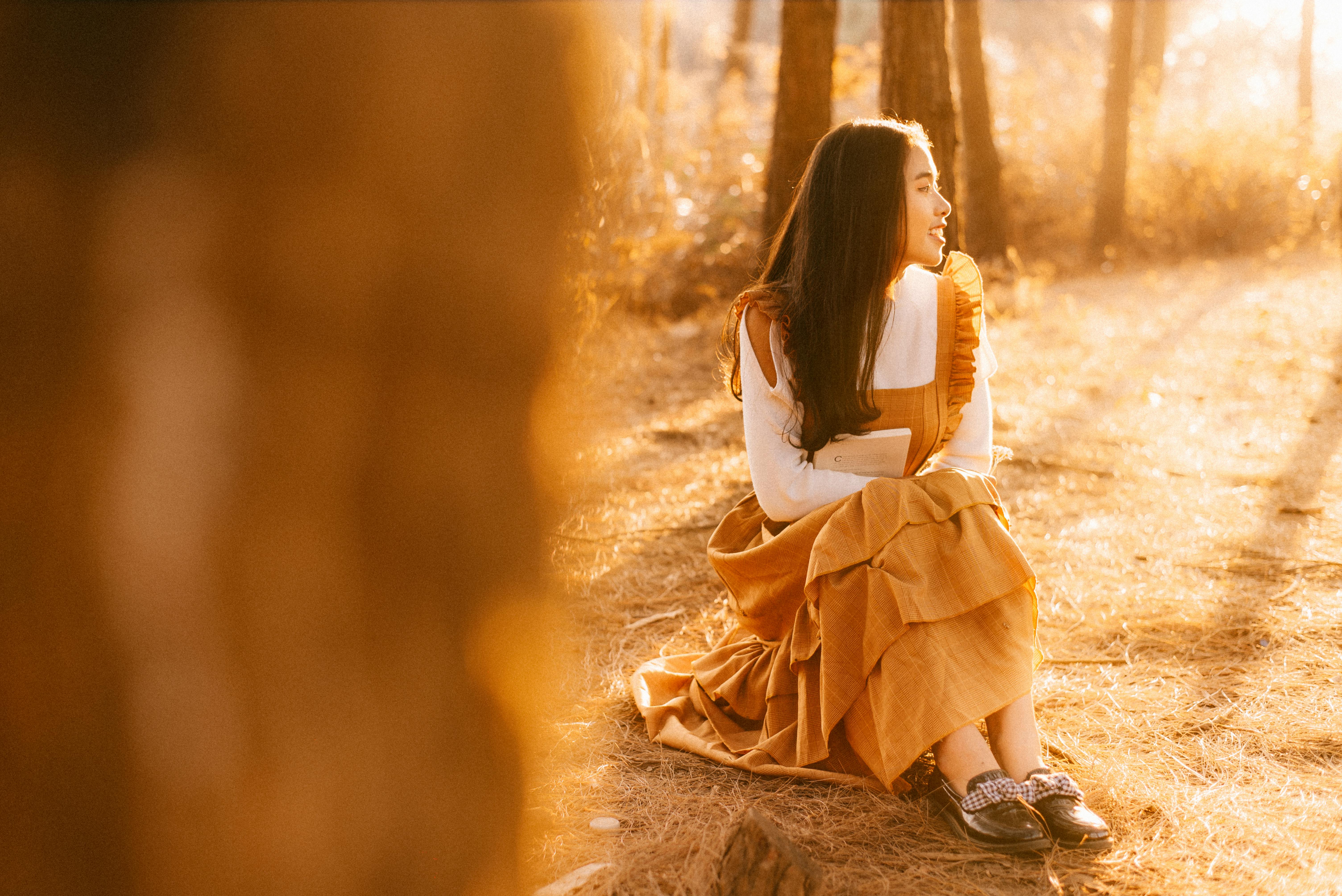 Woman Sitting on the Ground · Free Stock Photo