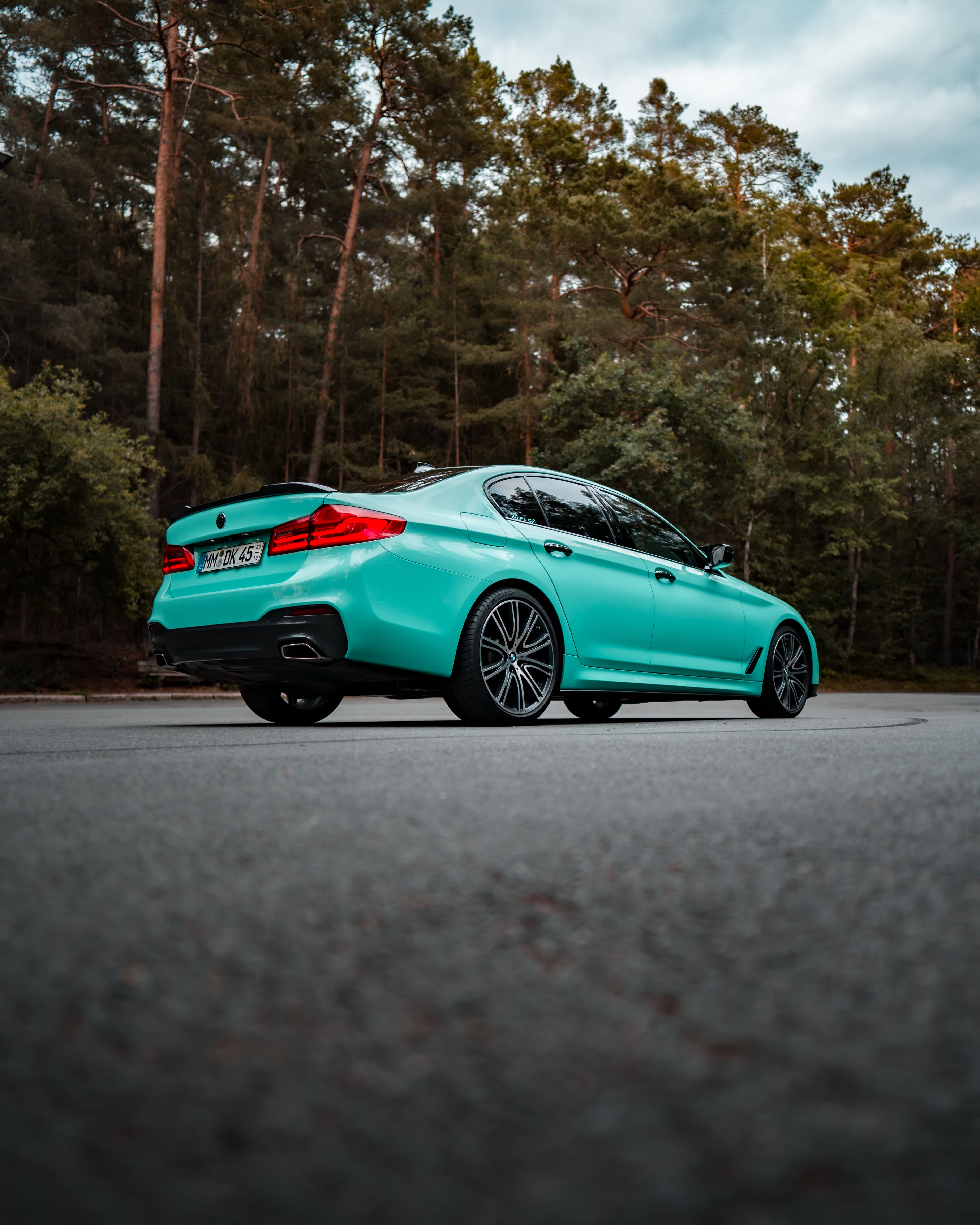 A Sedan Car Parked on the Road · Free Stock Photo
