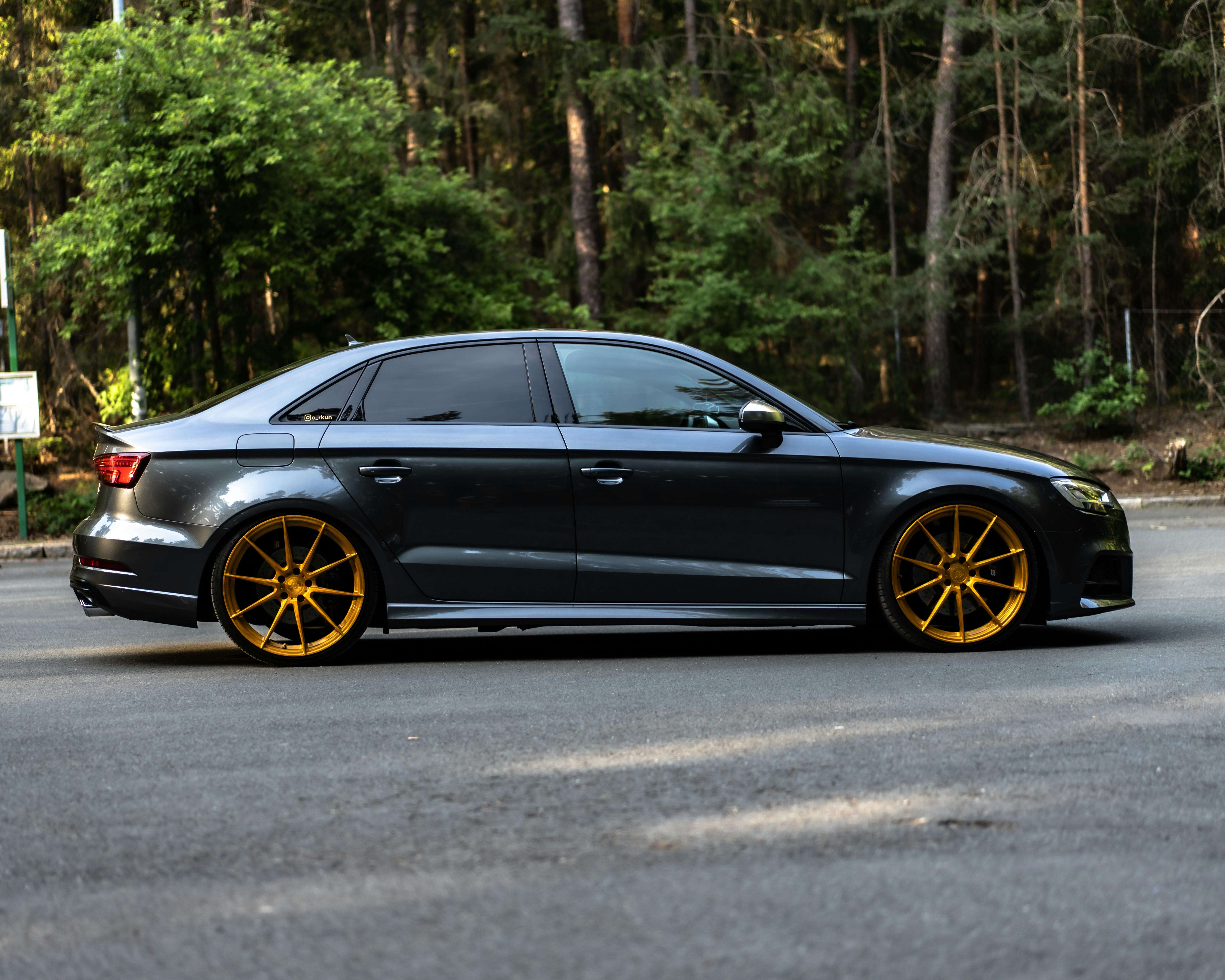 Black Car with Gold Rims Parked on the Road · Free Stock Photo