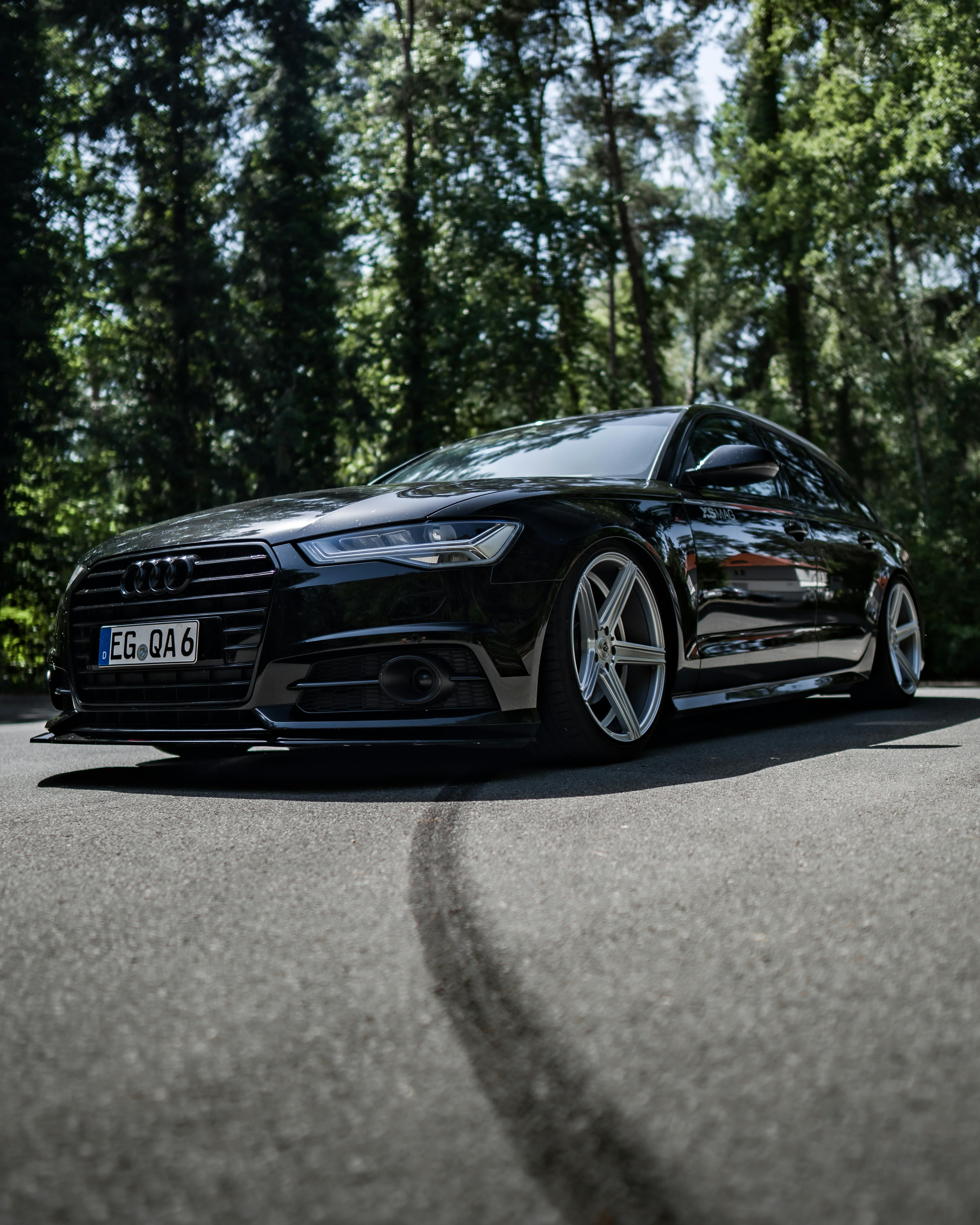 Low Angle Shot of a Black Car · Free Stock Photo