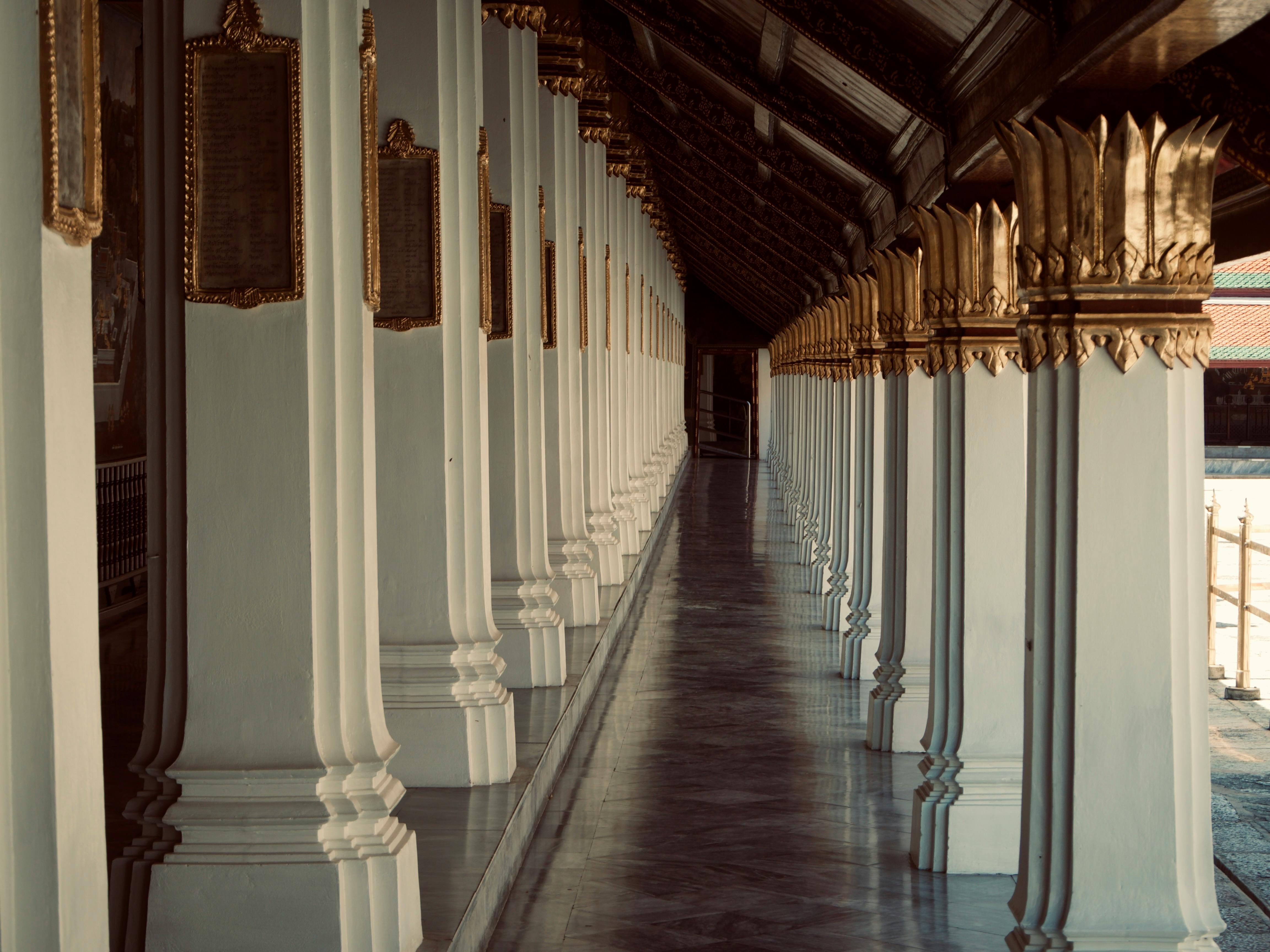 Photo of the White and Gold Columns in the Emerald Buddha Temple ...