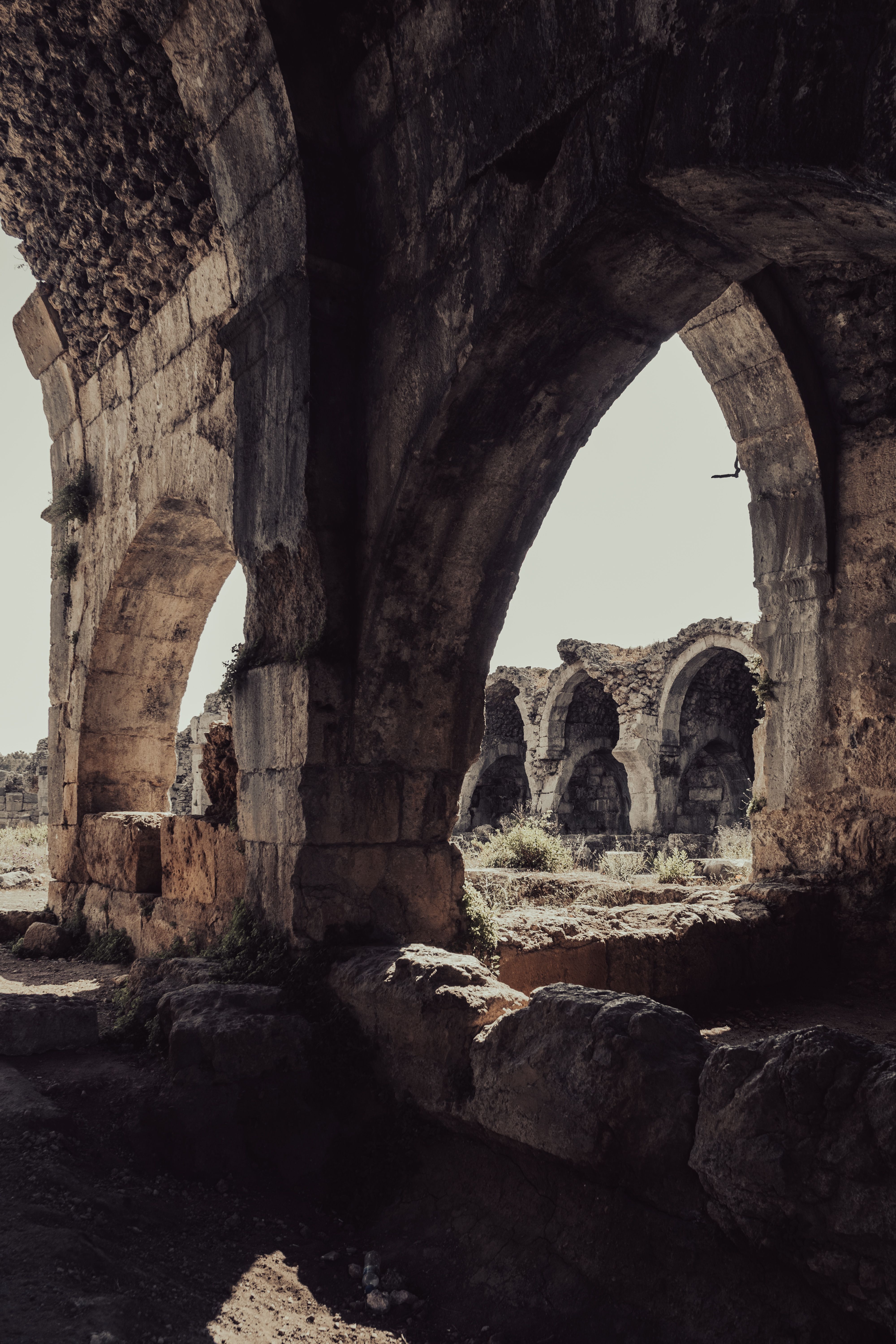 An Abandoned Stone Building with Half Arched Opening · Free Stock Photo