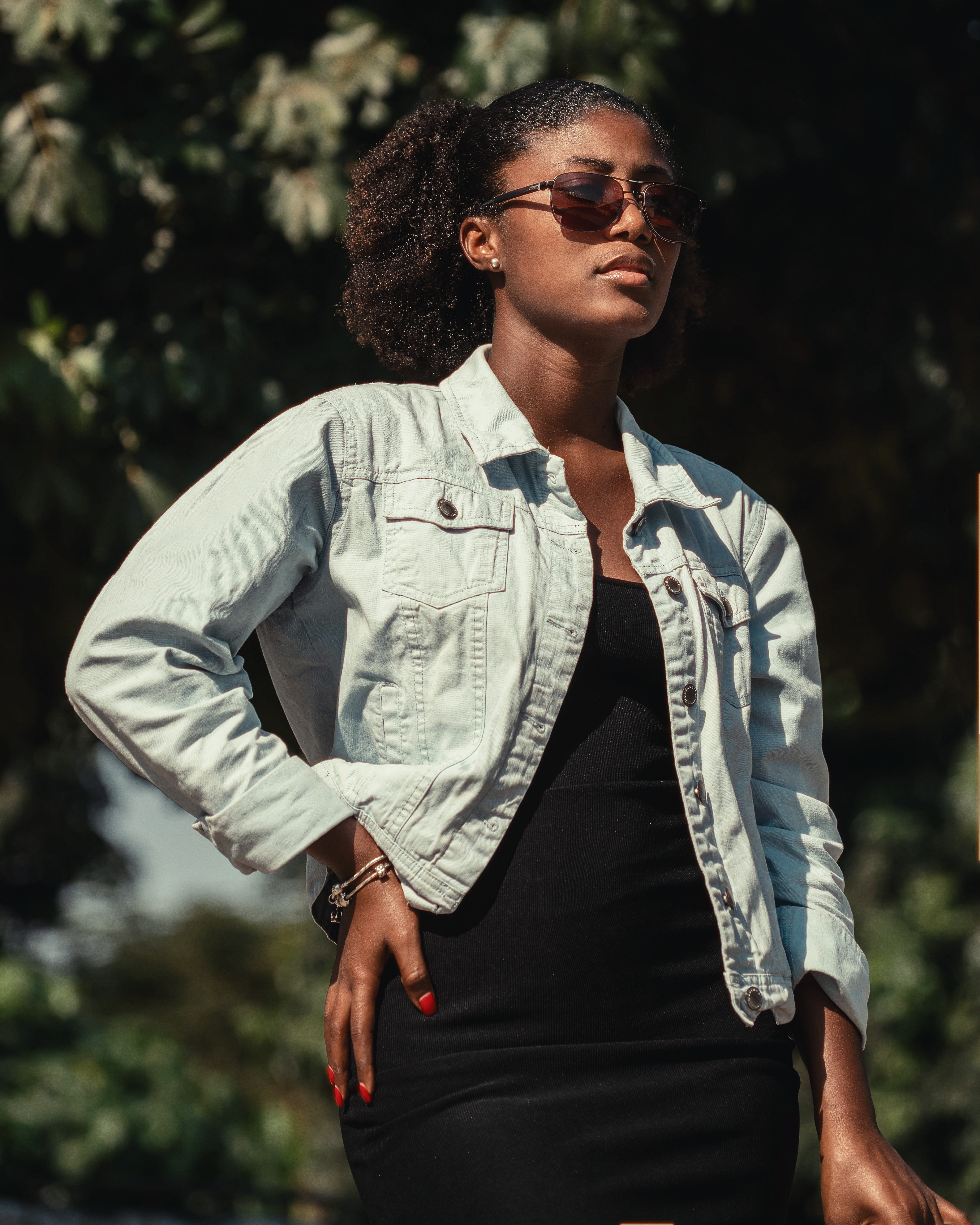 Muscular Woman in a Denim Jacket · Free Stock Photo