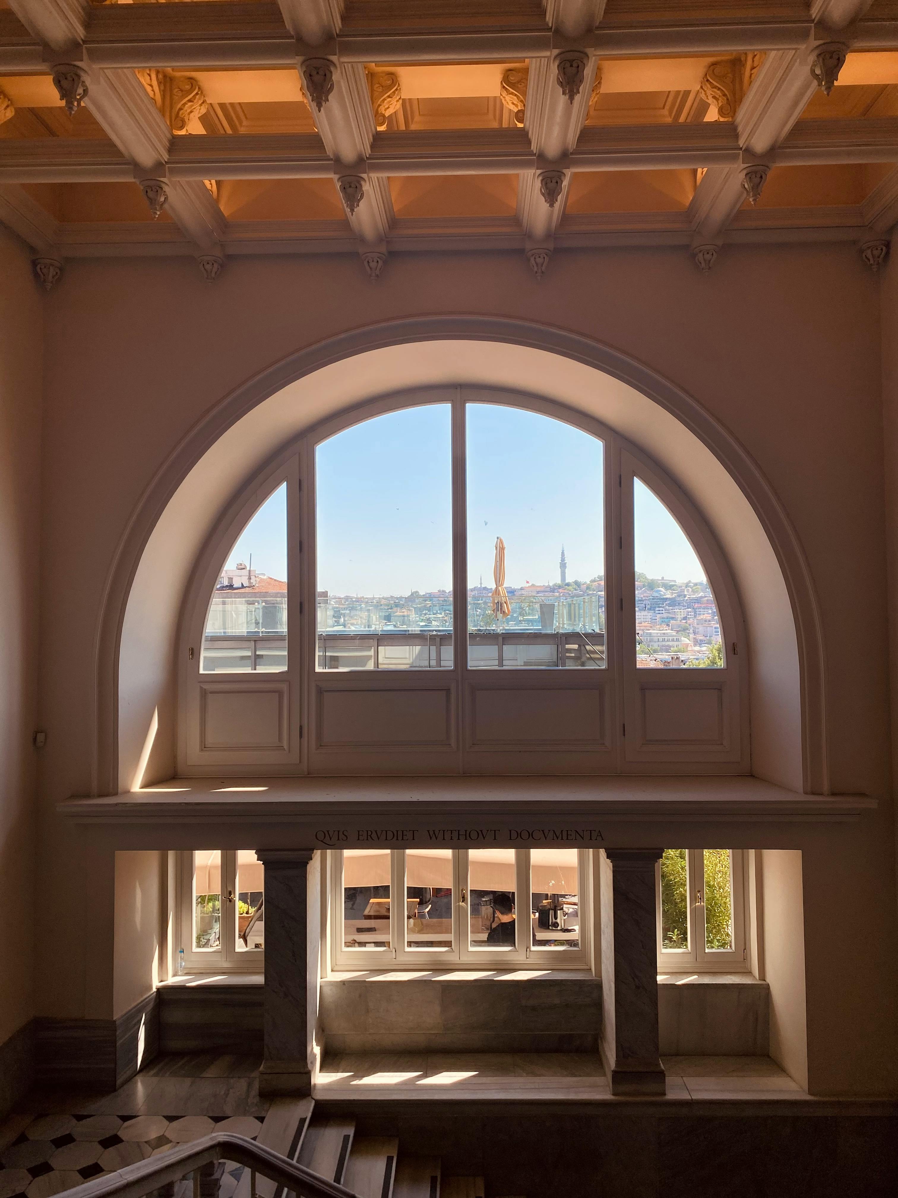 Clear Sky and Buildings behind Windows · Free Stock Photo