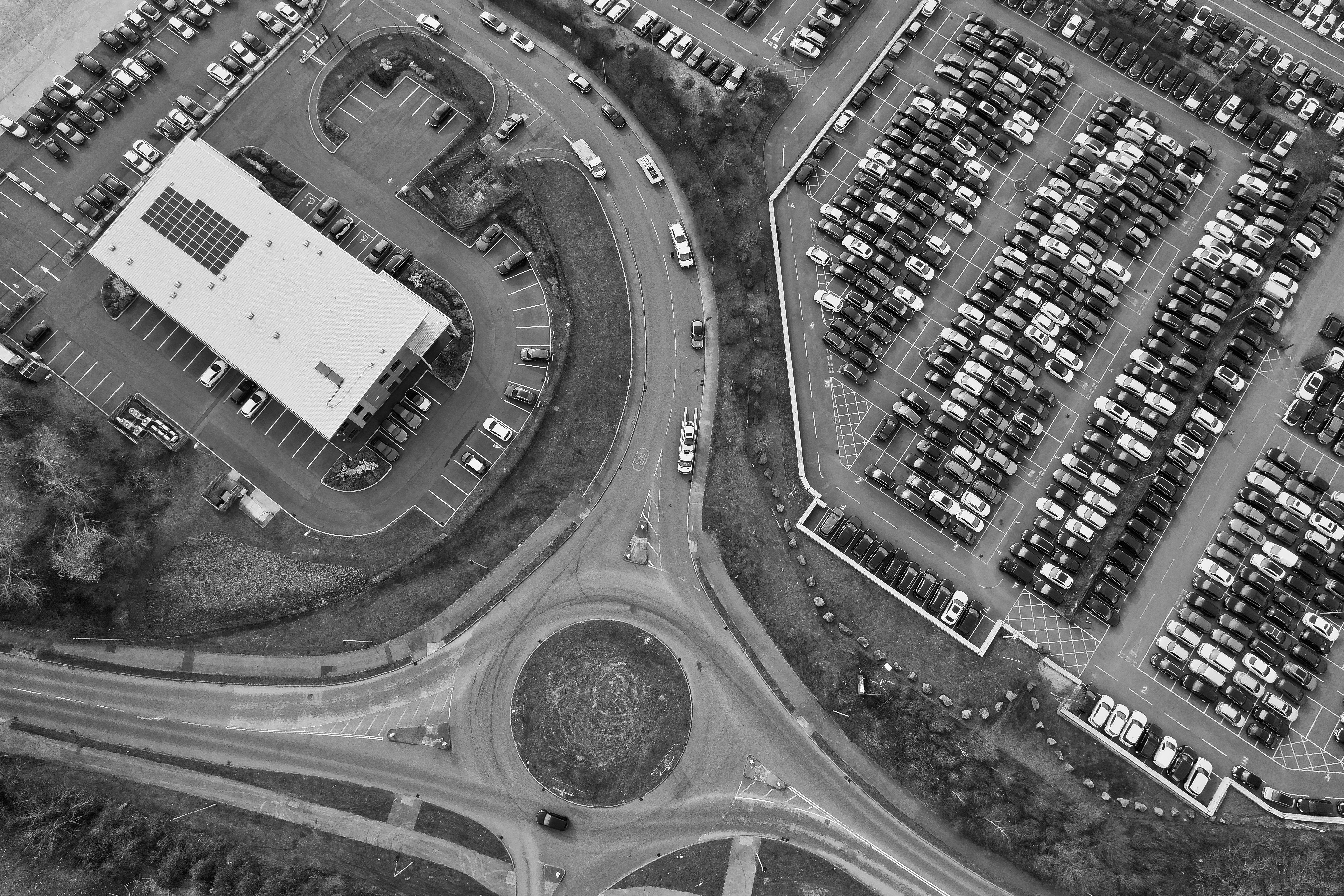 An Aerial Photography of Cars Parked Near the Roundabout · Free Stock Photo