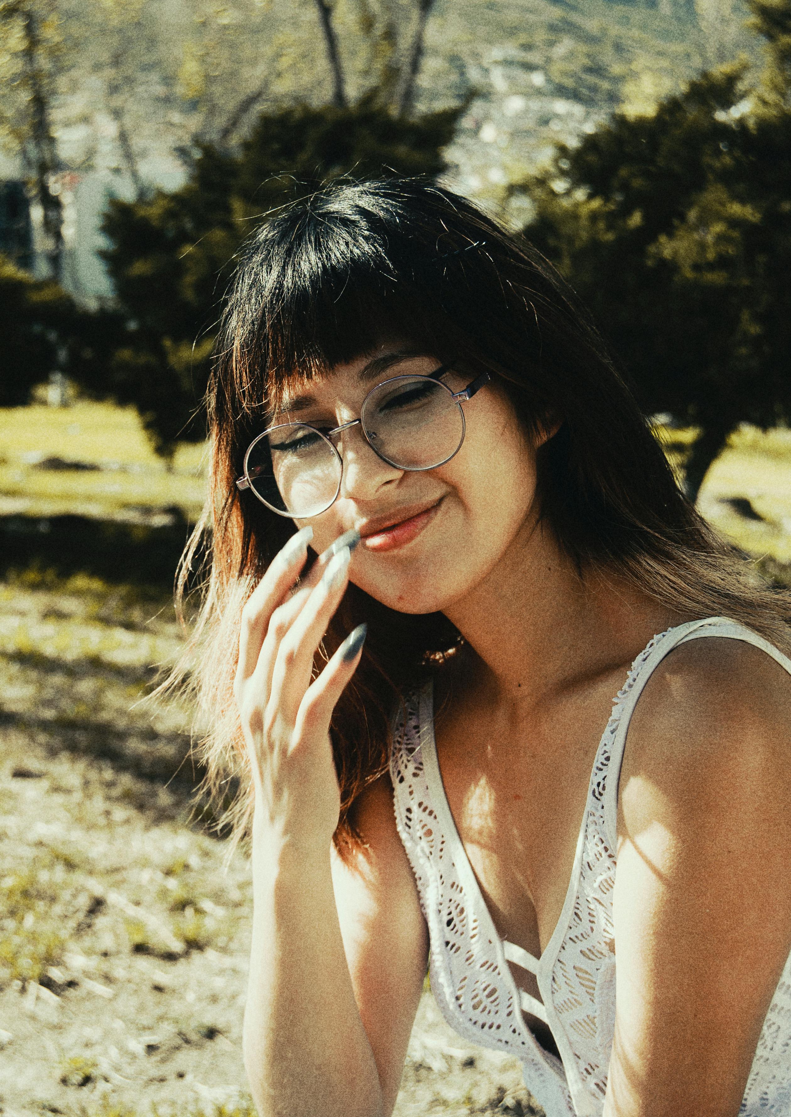 A Woman in Spaghetti Strap Top Smiling · Free Stock Photo