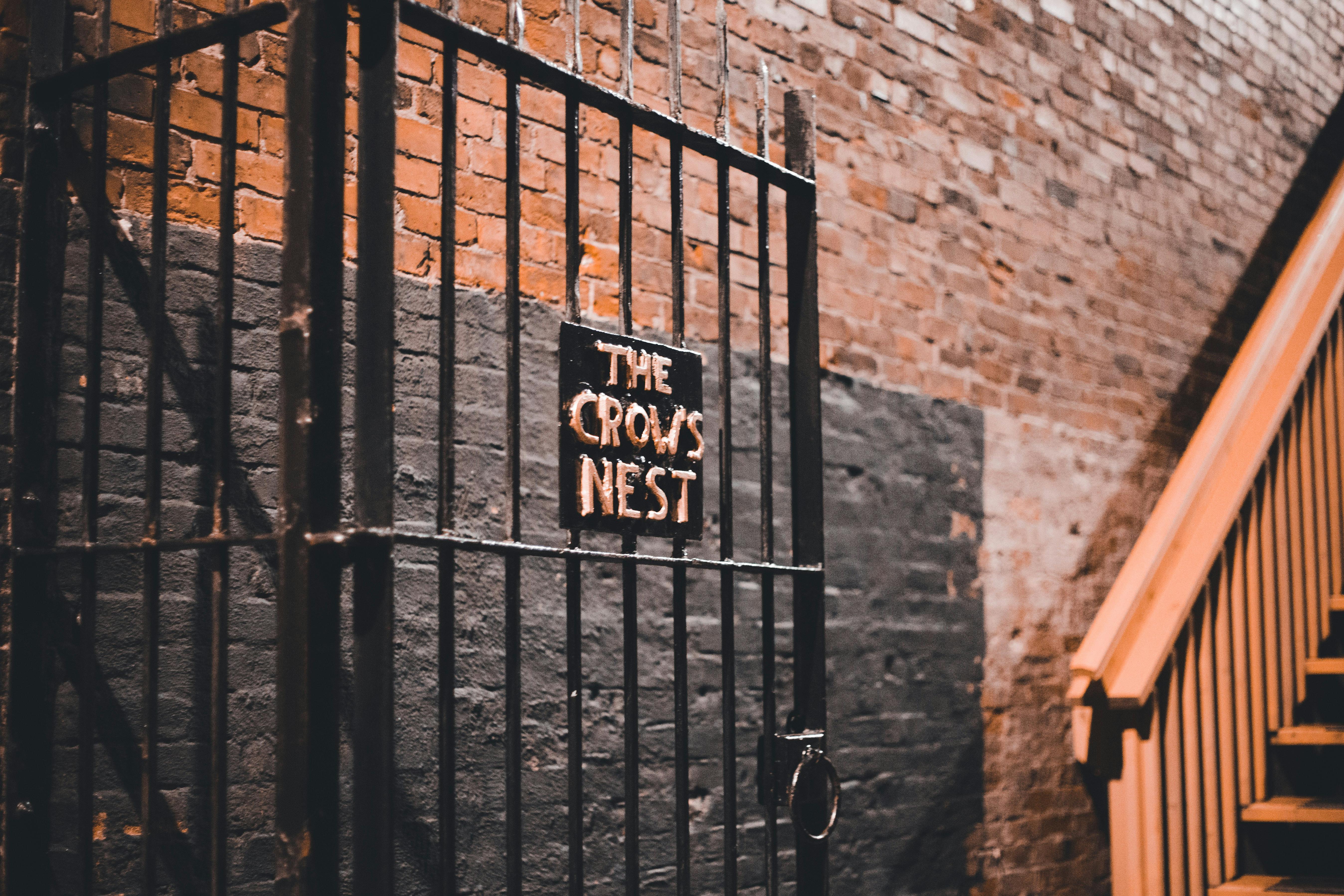 Gate with Sign in City Alley · Free Stock Photo