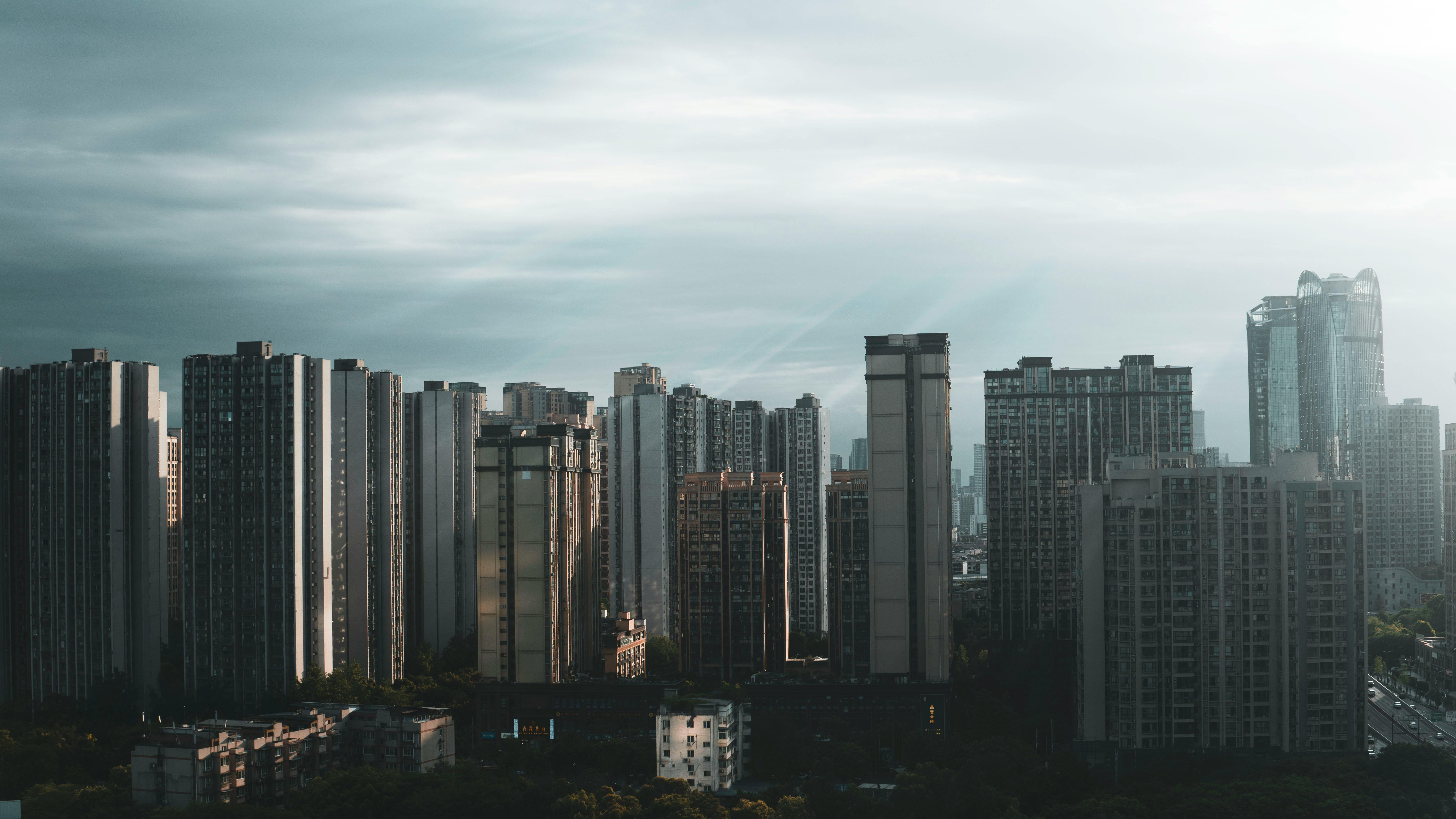 Clouds over Buildings in City · Free Stock Photo