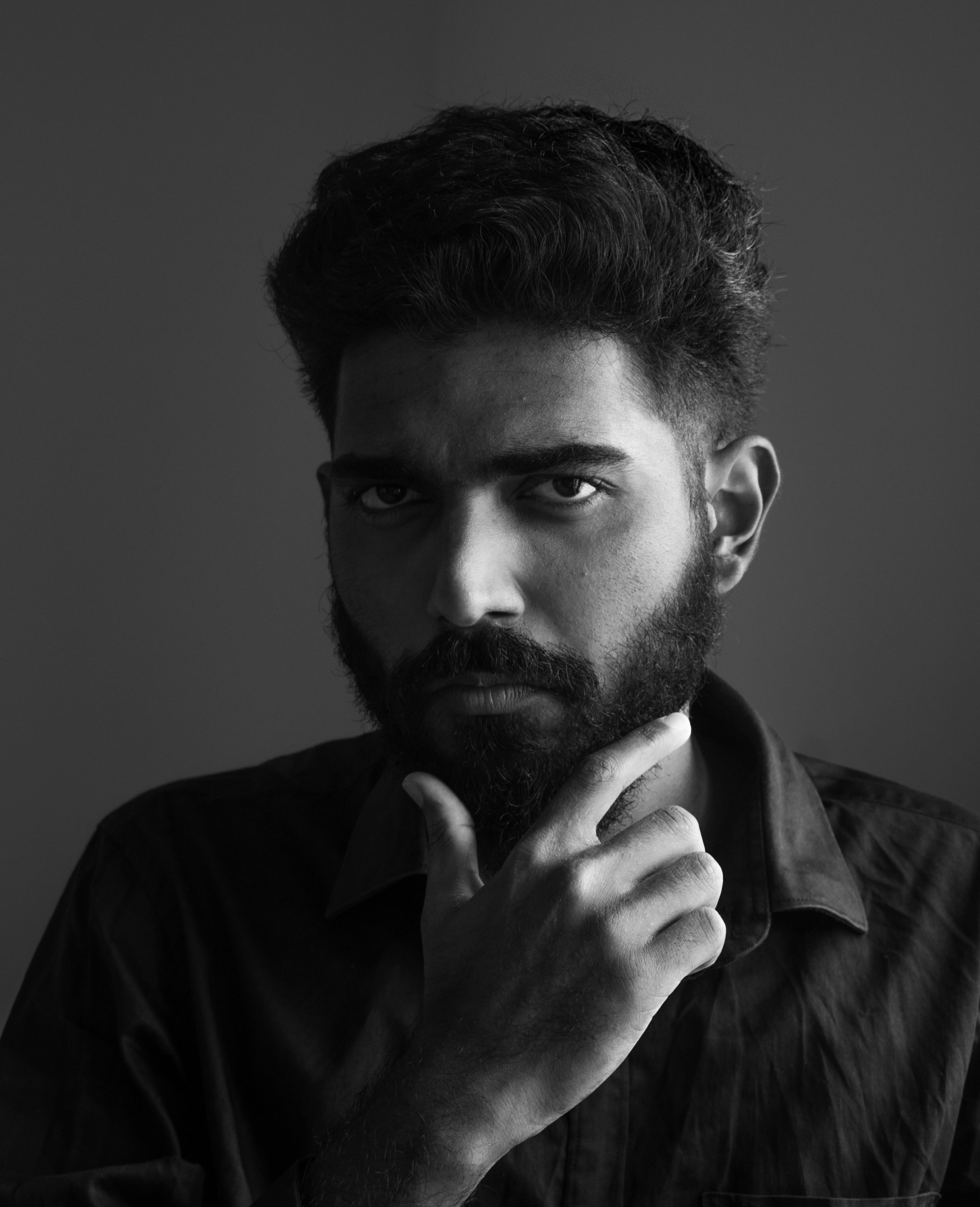 Man Posing and Touching his Face · Free Stock Photo