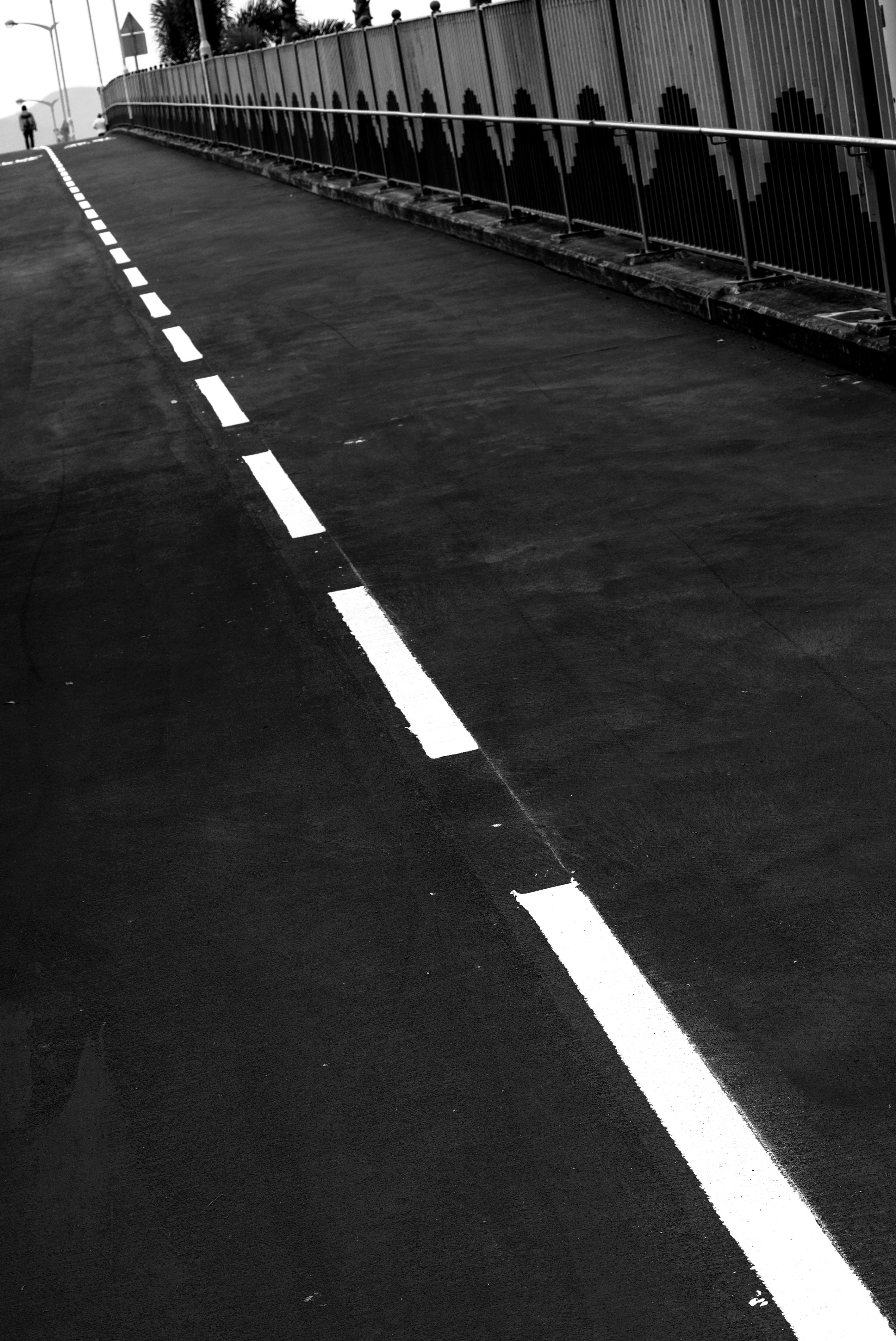 Grayscale Photo of Road Markings · Free Stock Photo