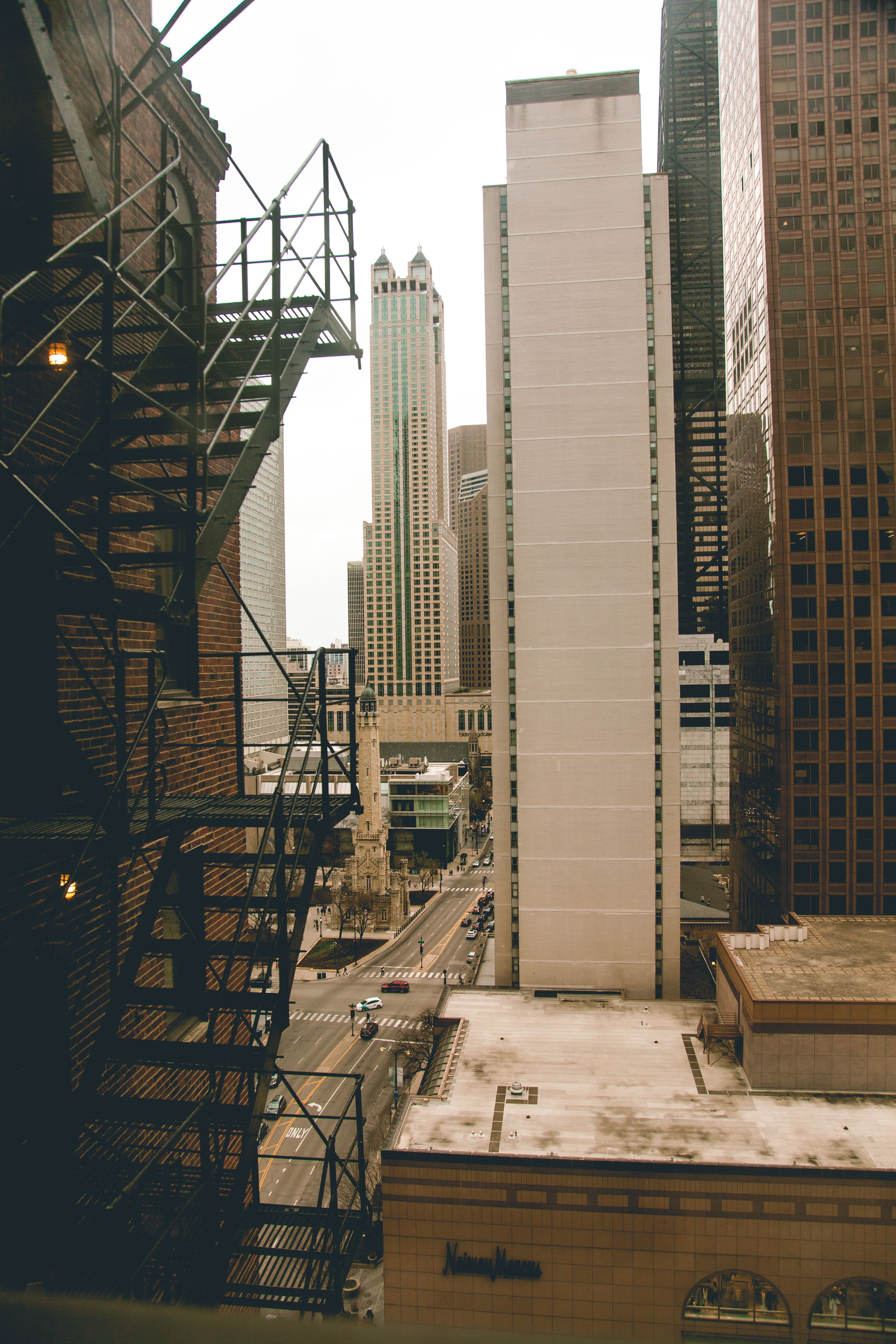 Man in Hardhat Standing in a Doorway at Fire Escape Stairs Landing ...