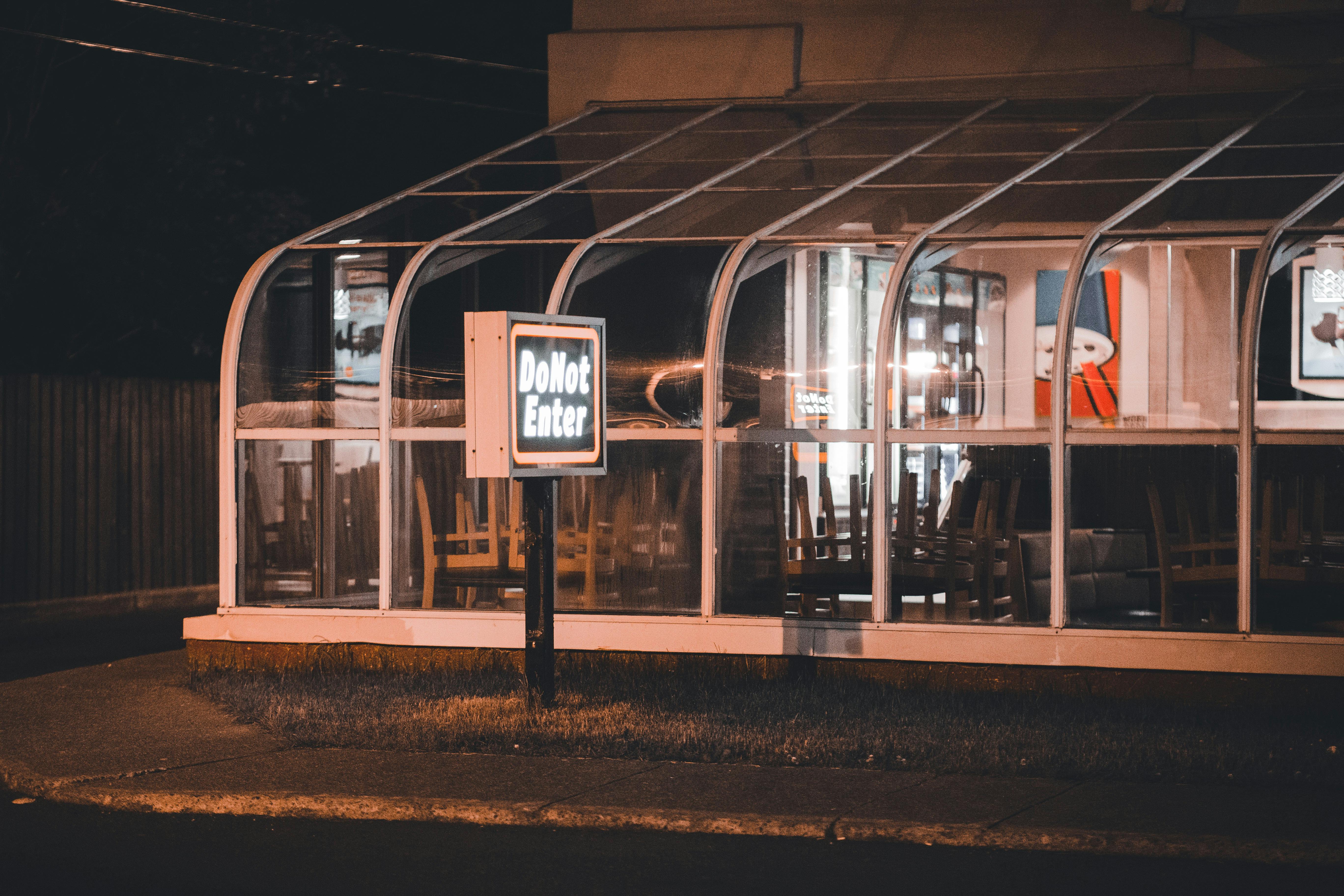 Do Not Enter Signage Beside a Glass Window · Free Stock Photo