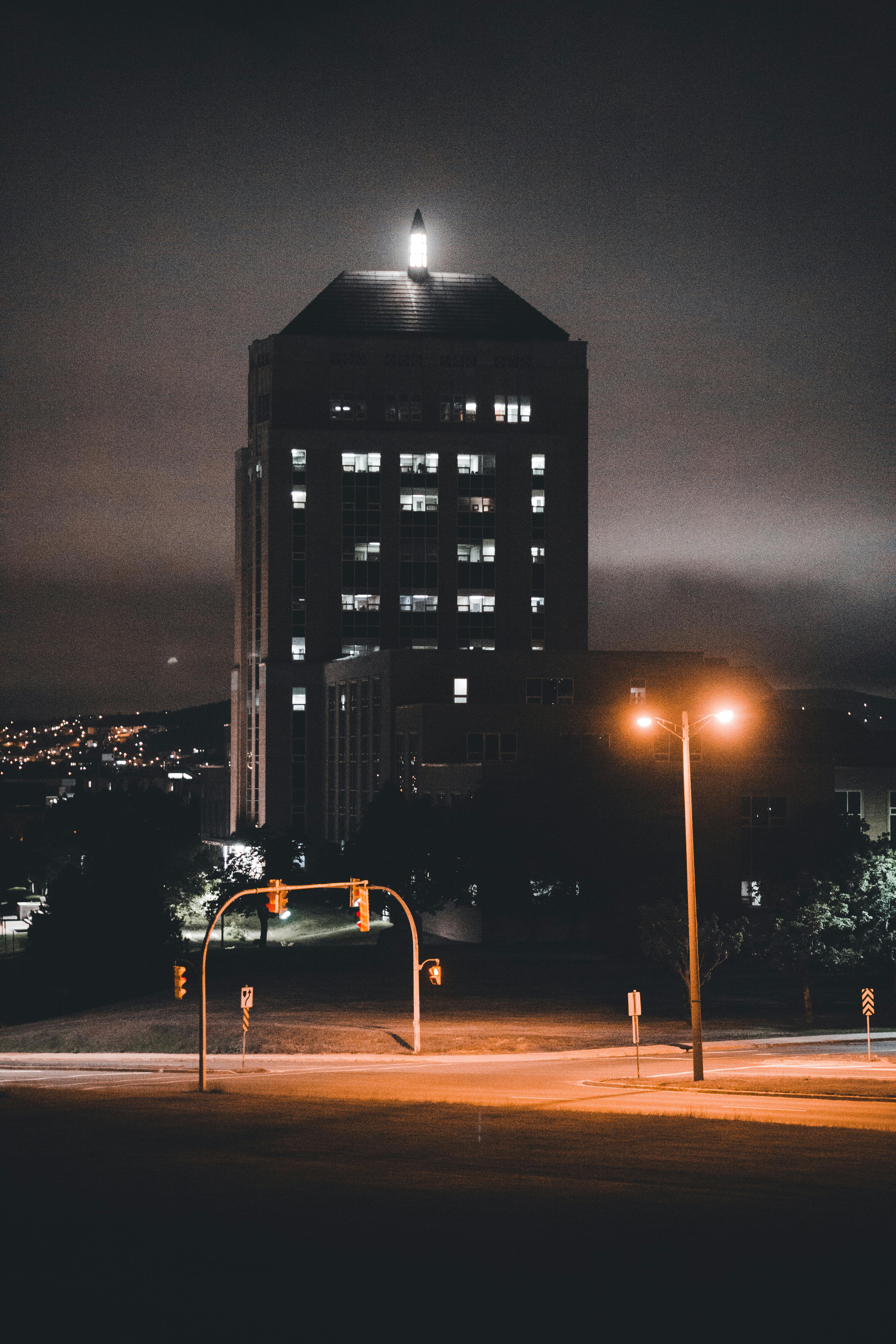A High Rise Building Illuminated at Night · Free Stock Photo