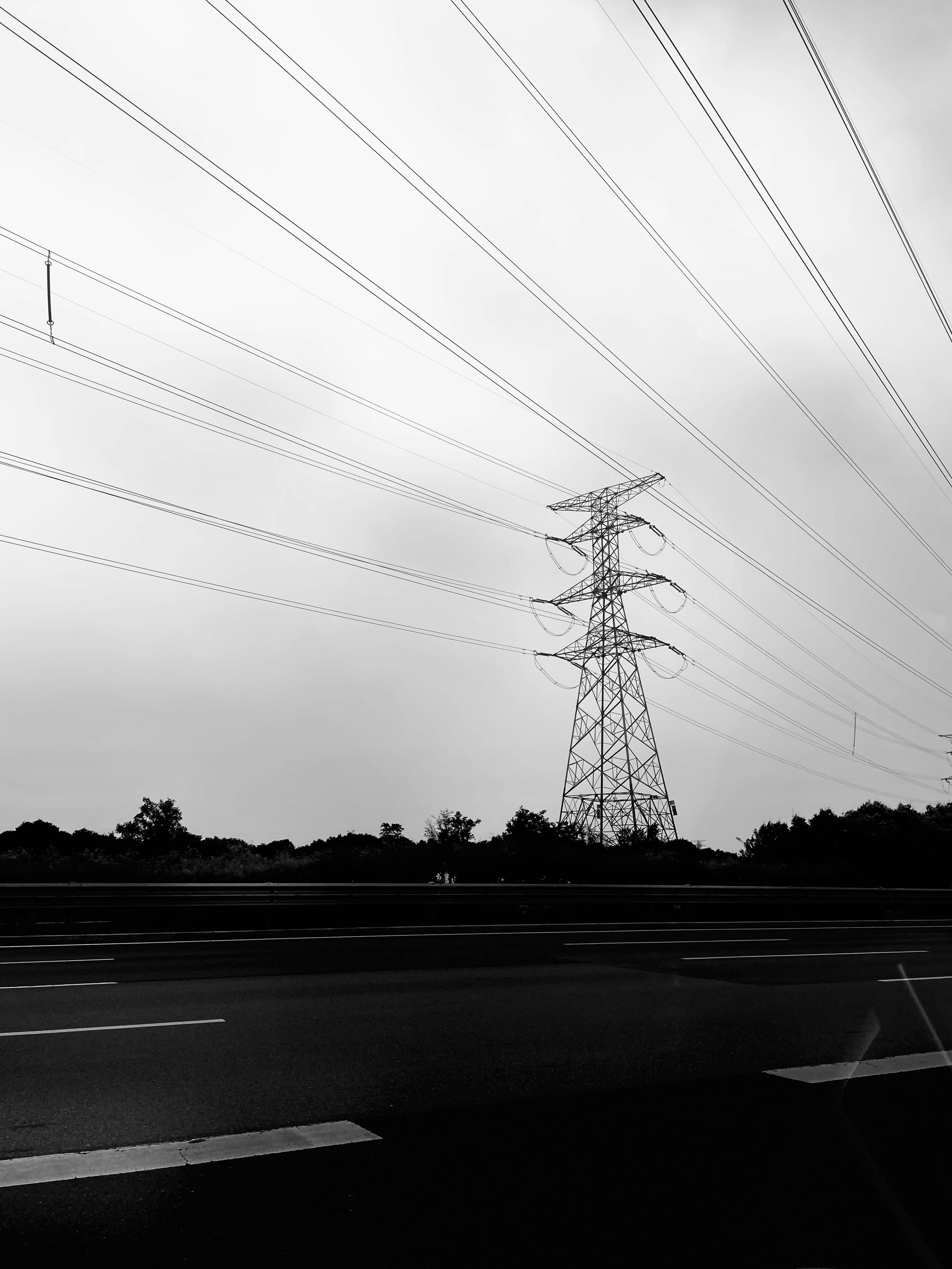 A Grayscale of an Overhead Power Line · Free Stock Photo