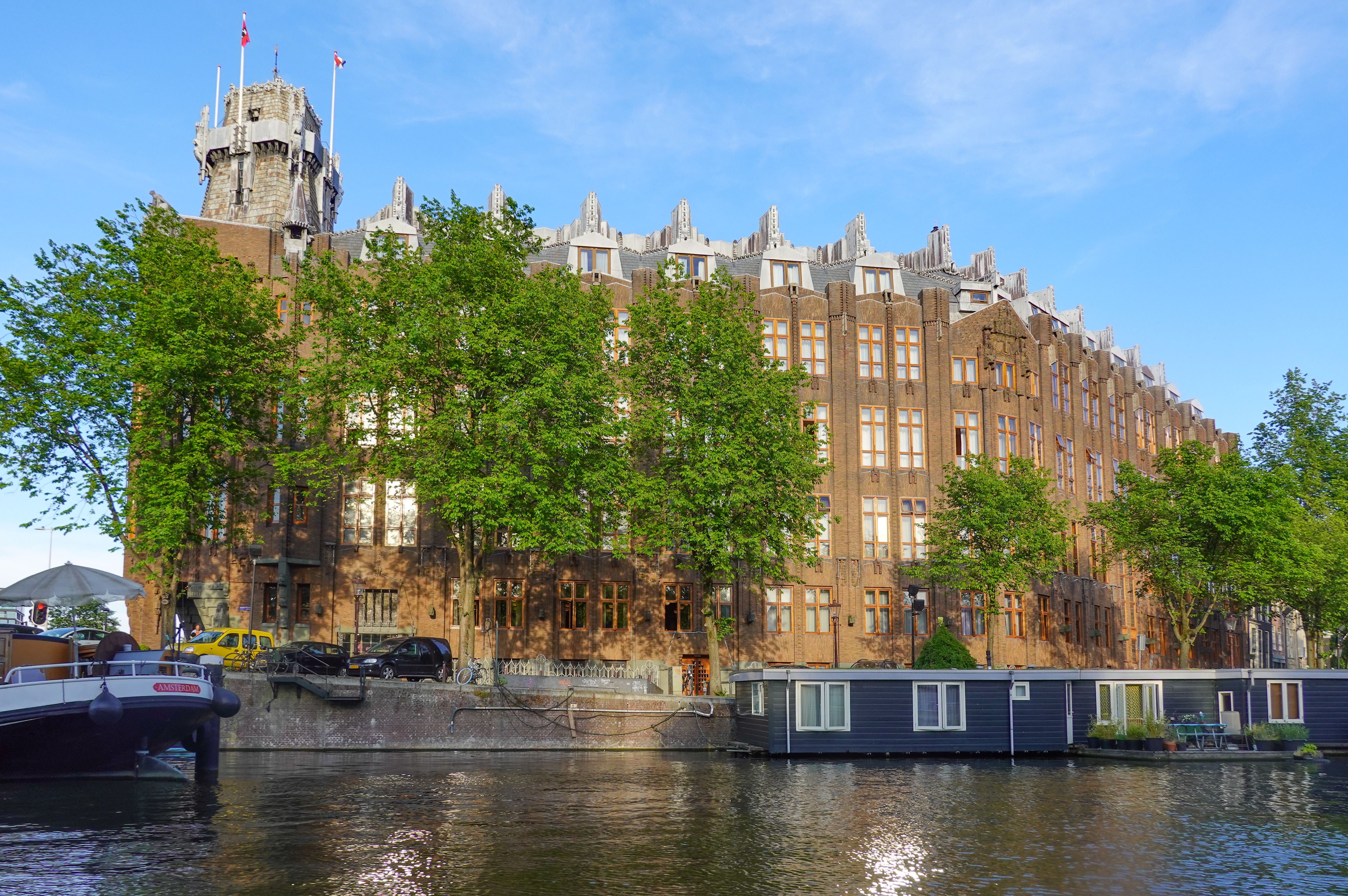 A Concrete Building near a Body of Water · Free Stock Photo