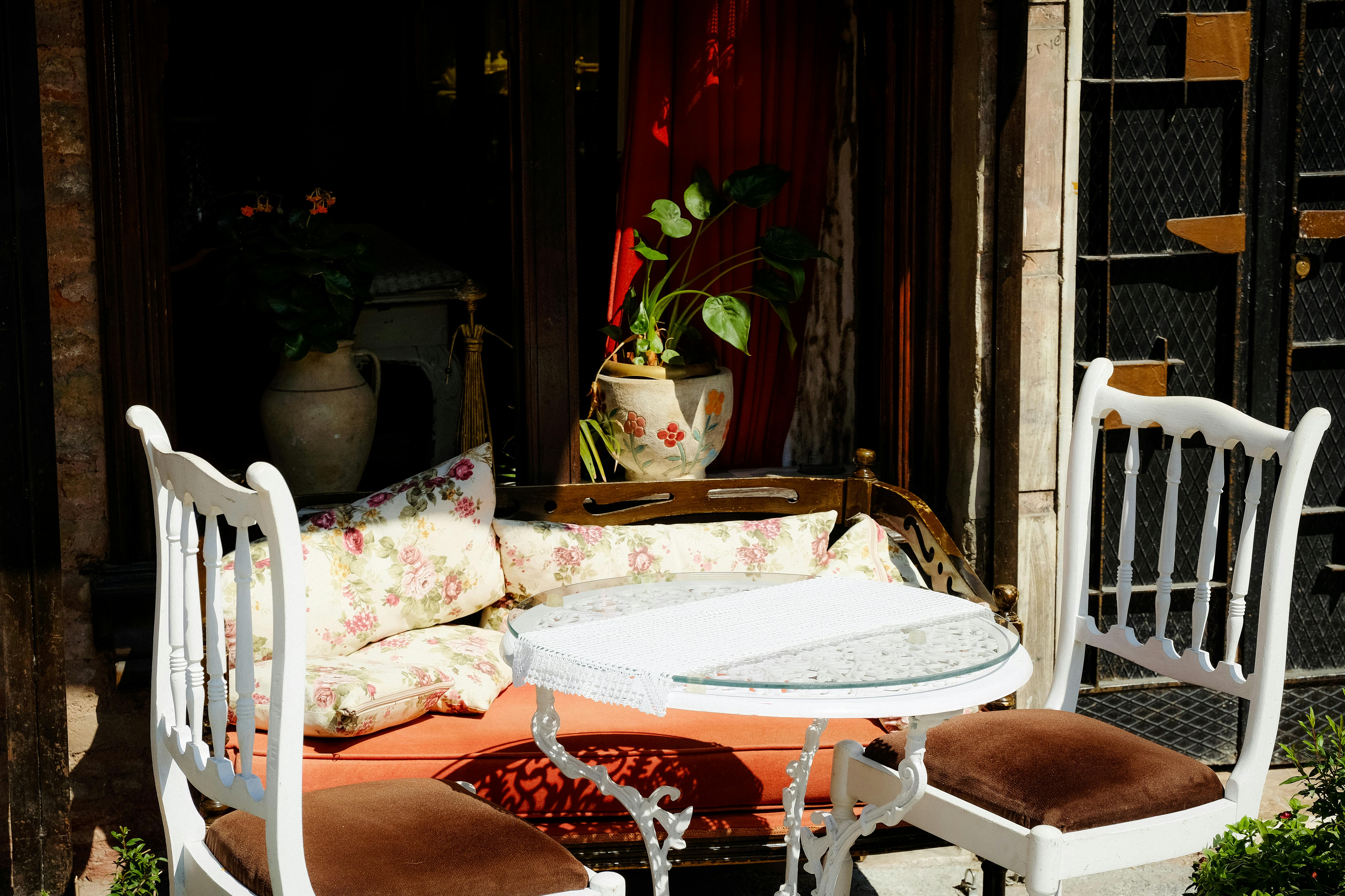 White Chair Beside Wooden Table · Free Stock Photo