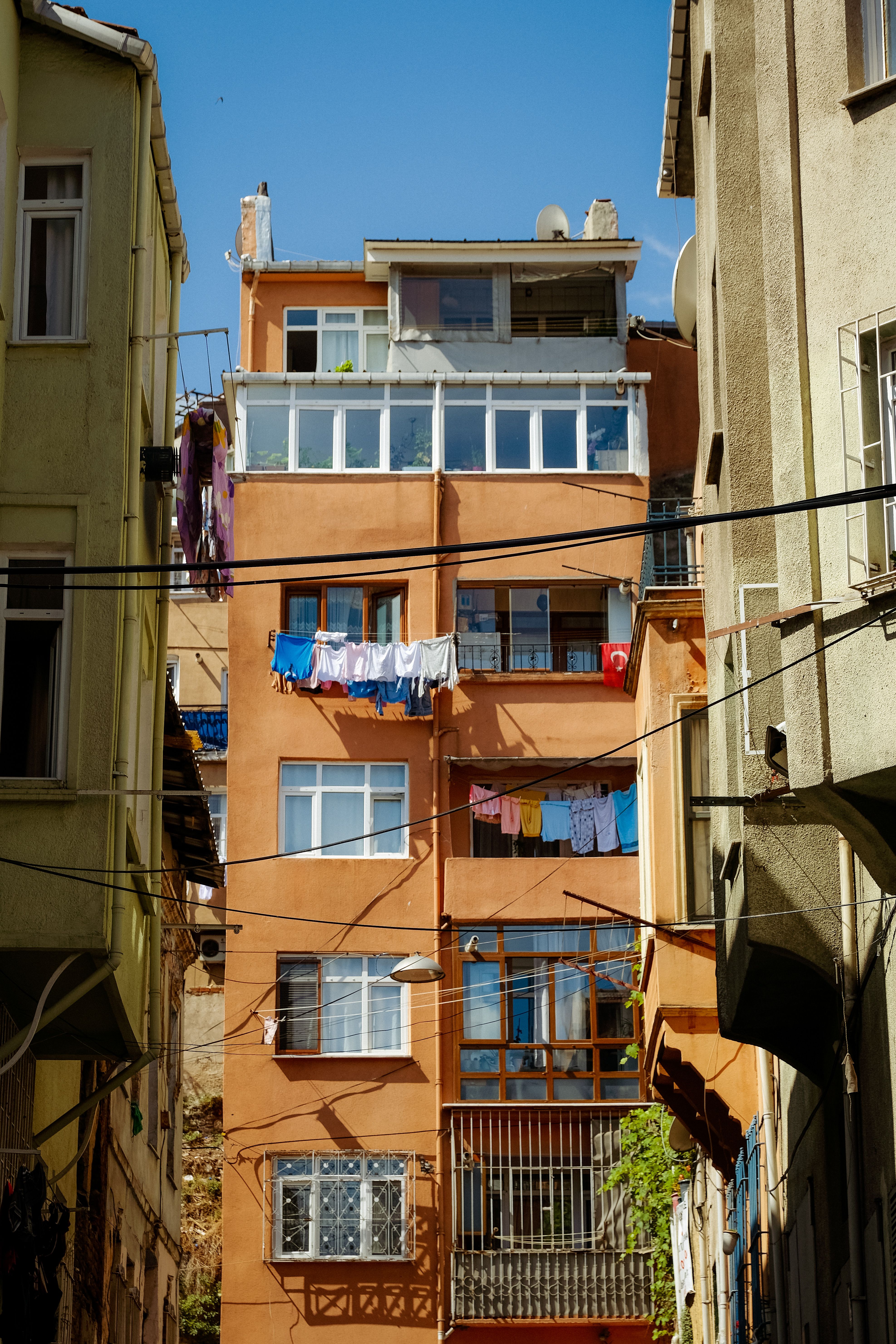 Apartment Building with Hanging Clothes · Free Stock Photo