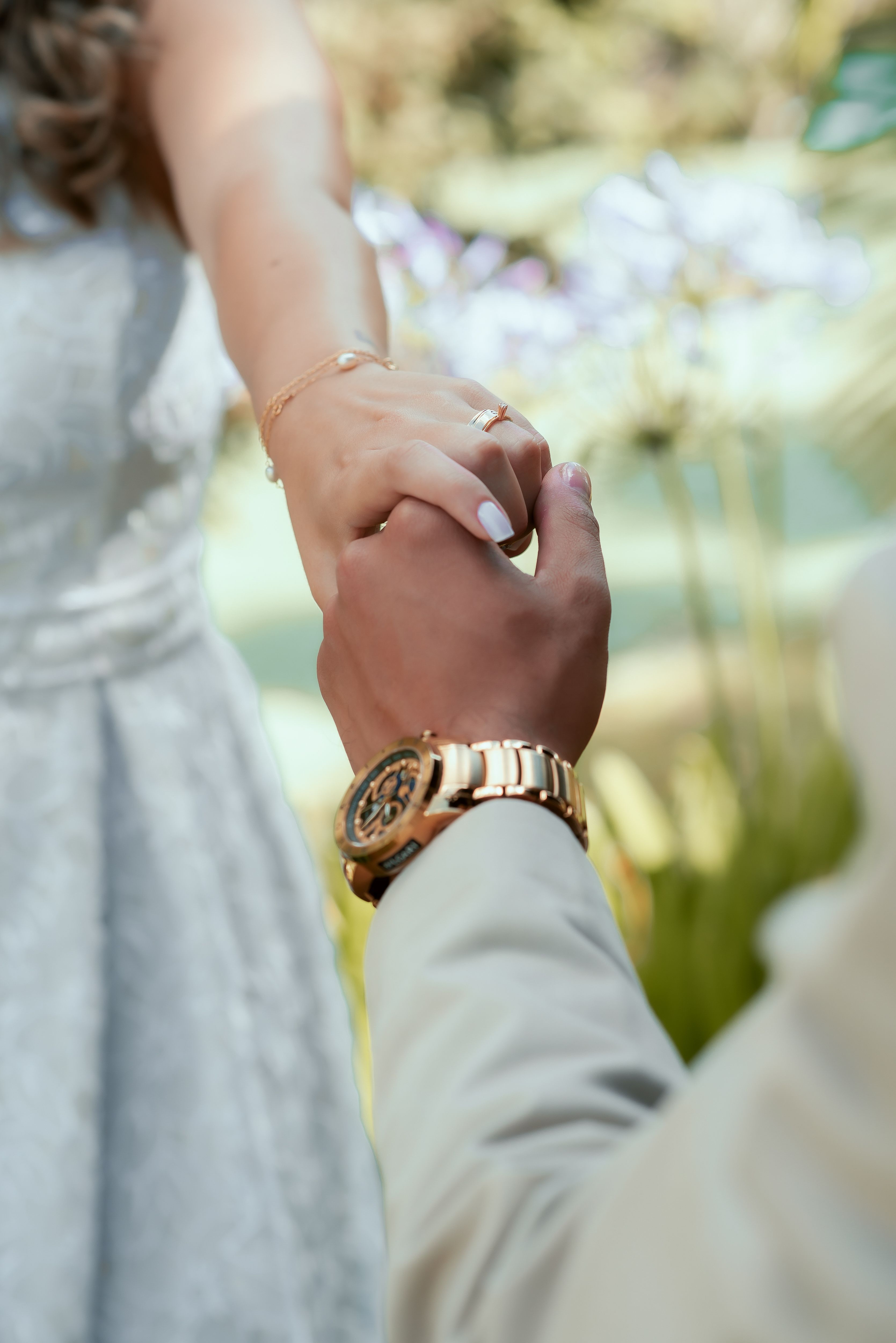 Joined Hands of Newlyweds · Free Stock Photo
