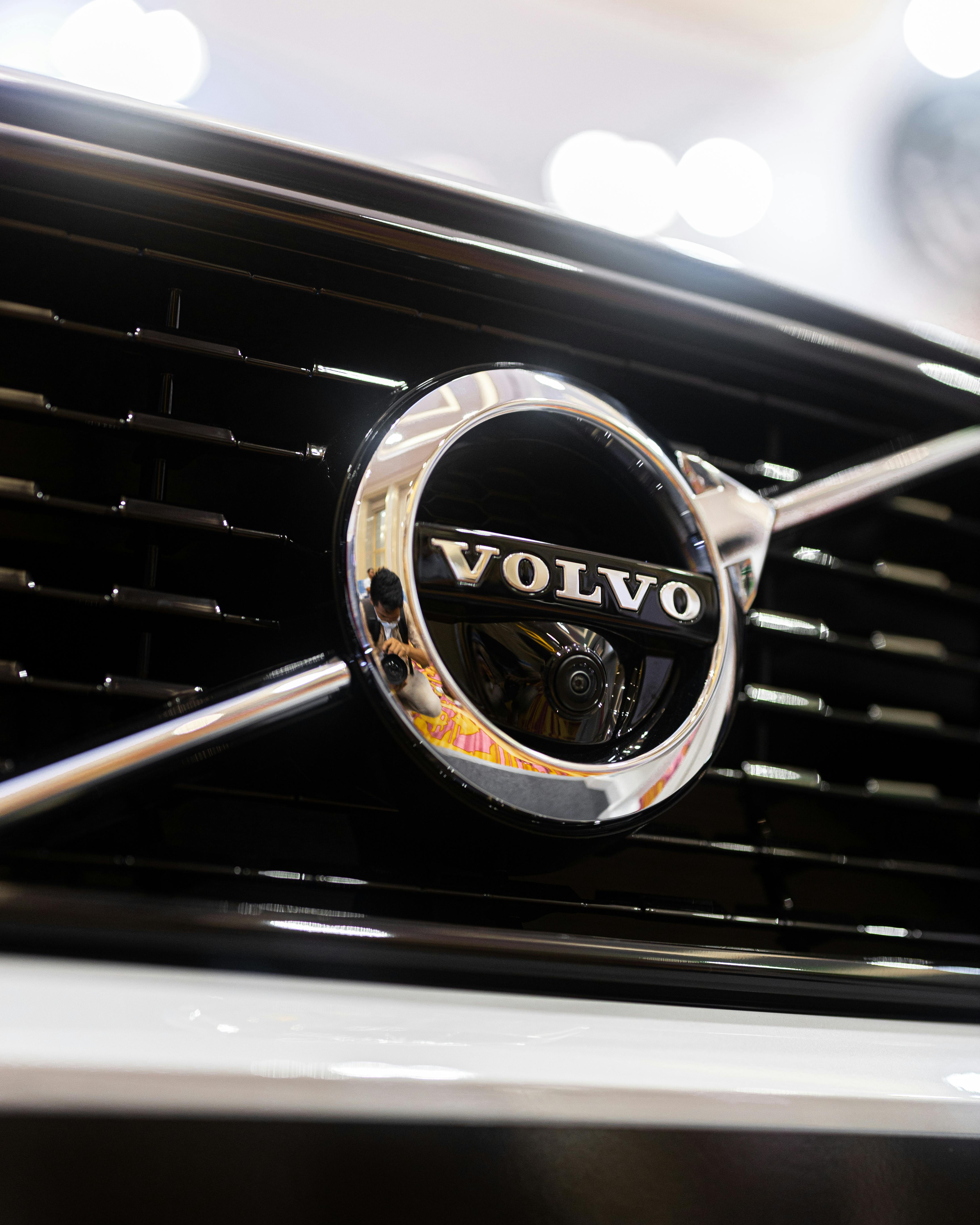 Volvo Emblem in Front of a Car Grill · Free Stock Photo