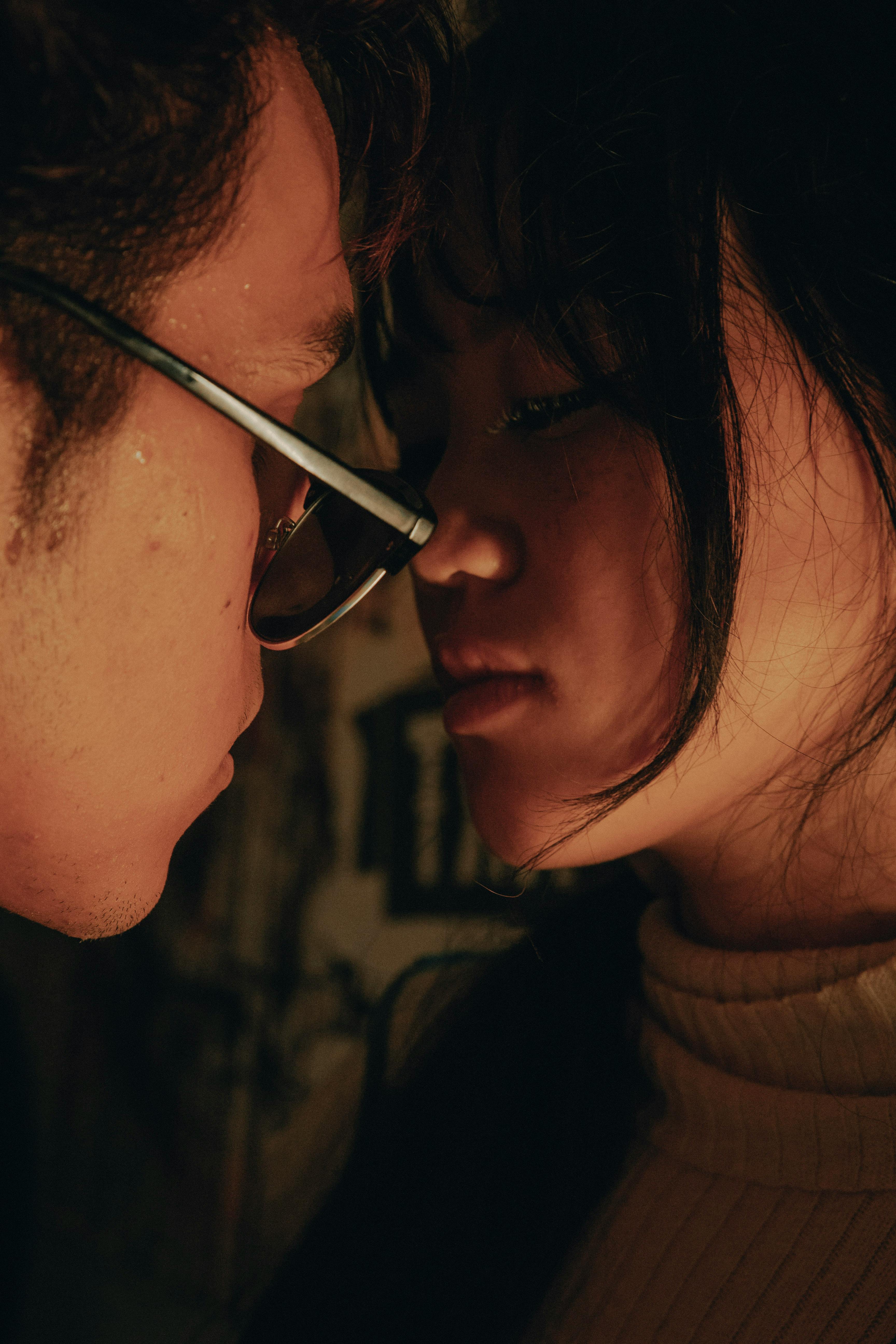 A Couple Face to Face with Each Other · Free Stock Photo