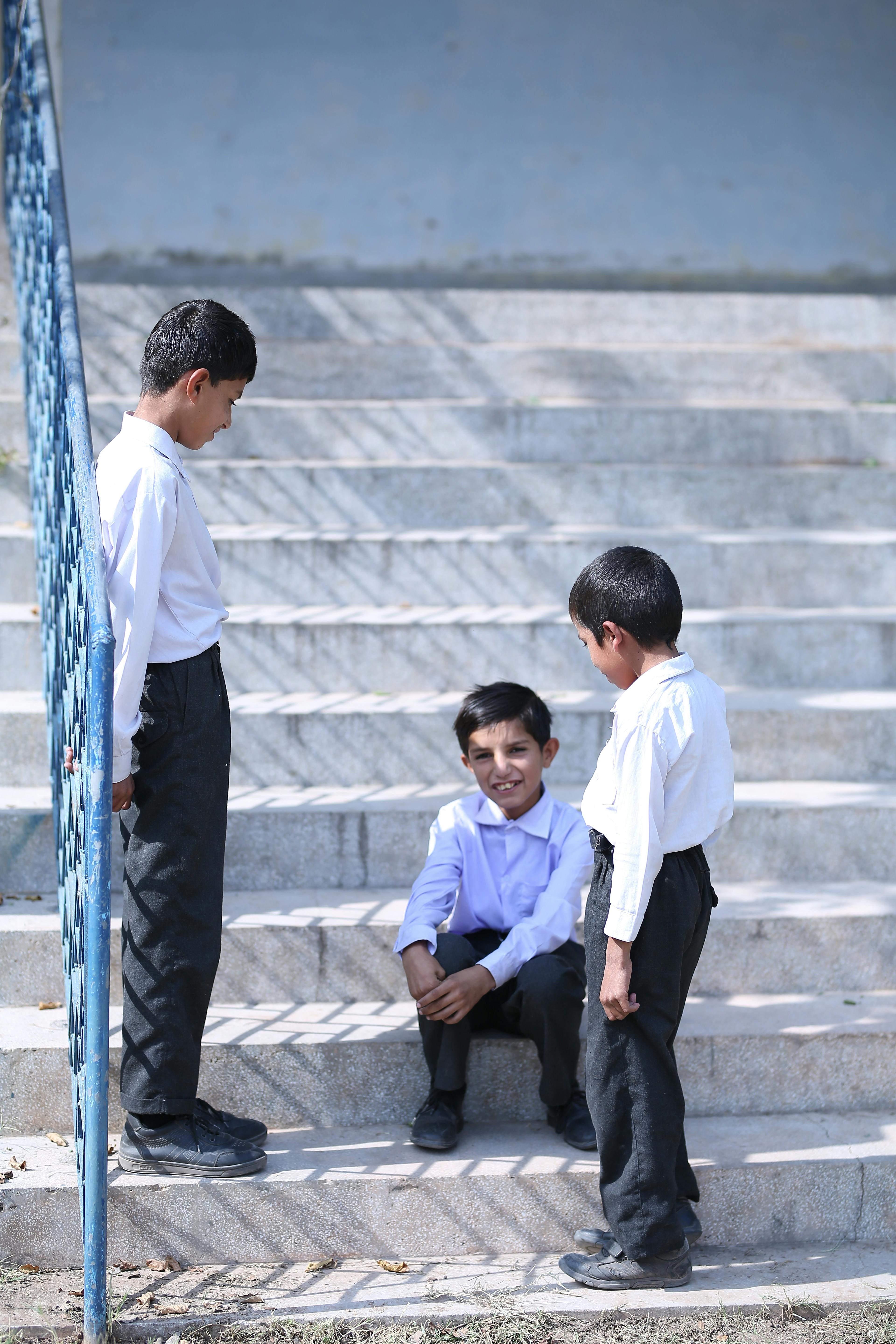 Three Boys Smiling Together · Free Stock Photo