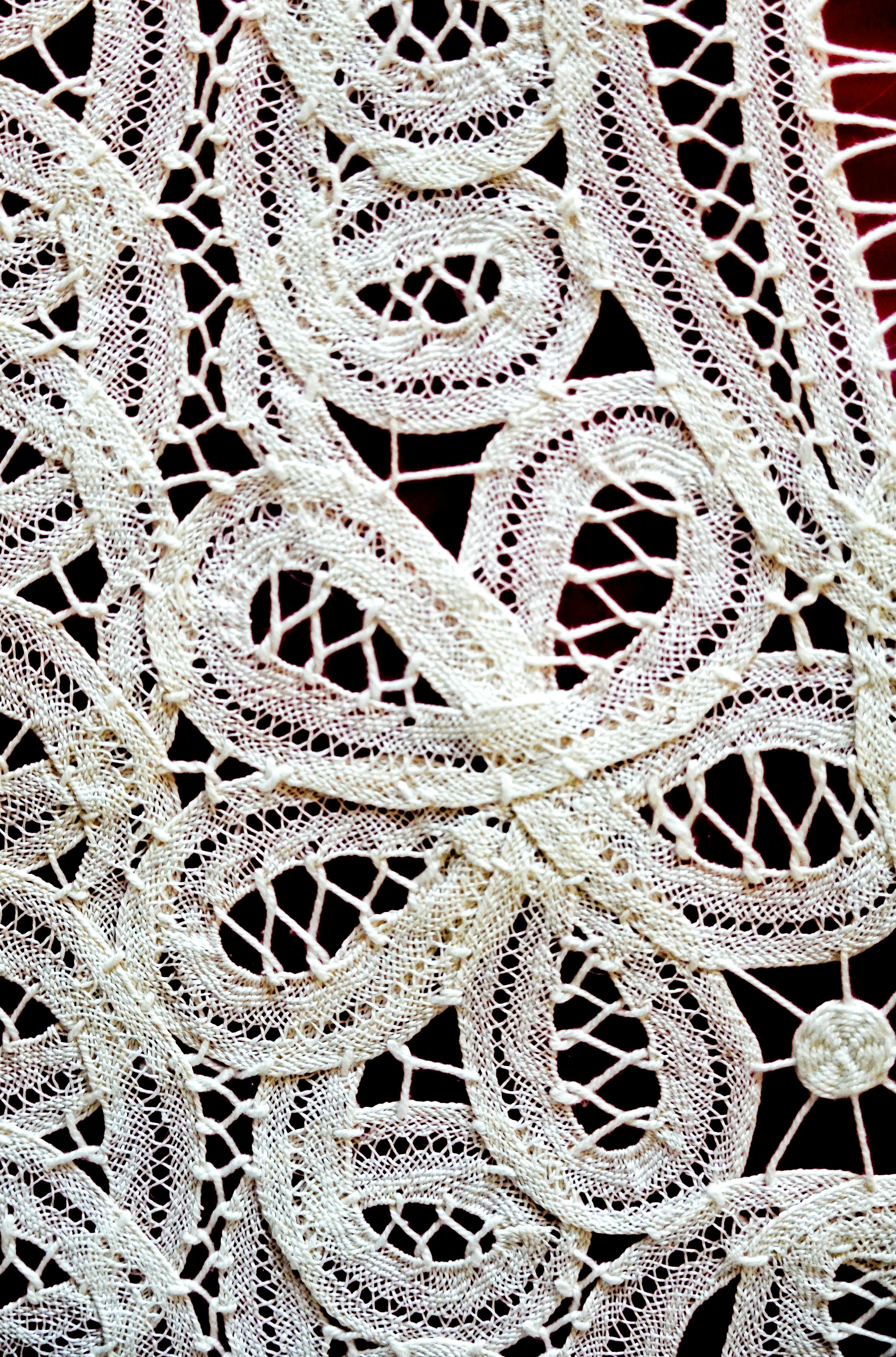 A Close-Up Shot of a Lace Table Cloth · Free Stock Photo