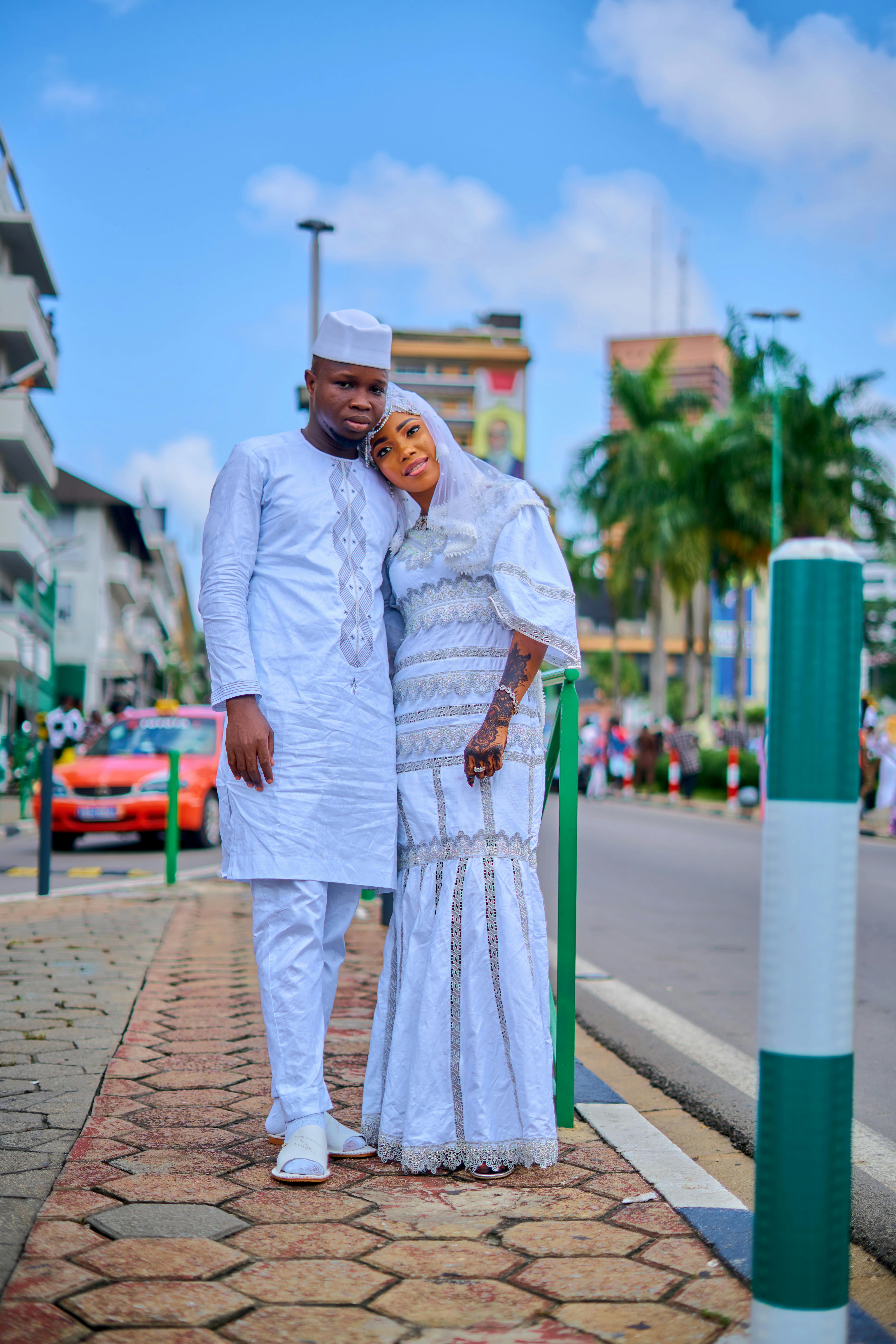 Woman and Man Posing Together in Traditional Clothing · Free Stock Photo