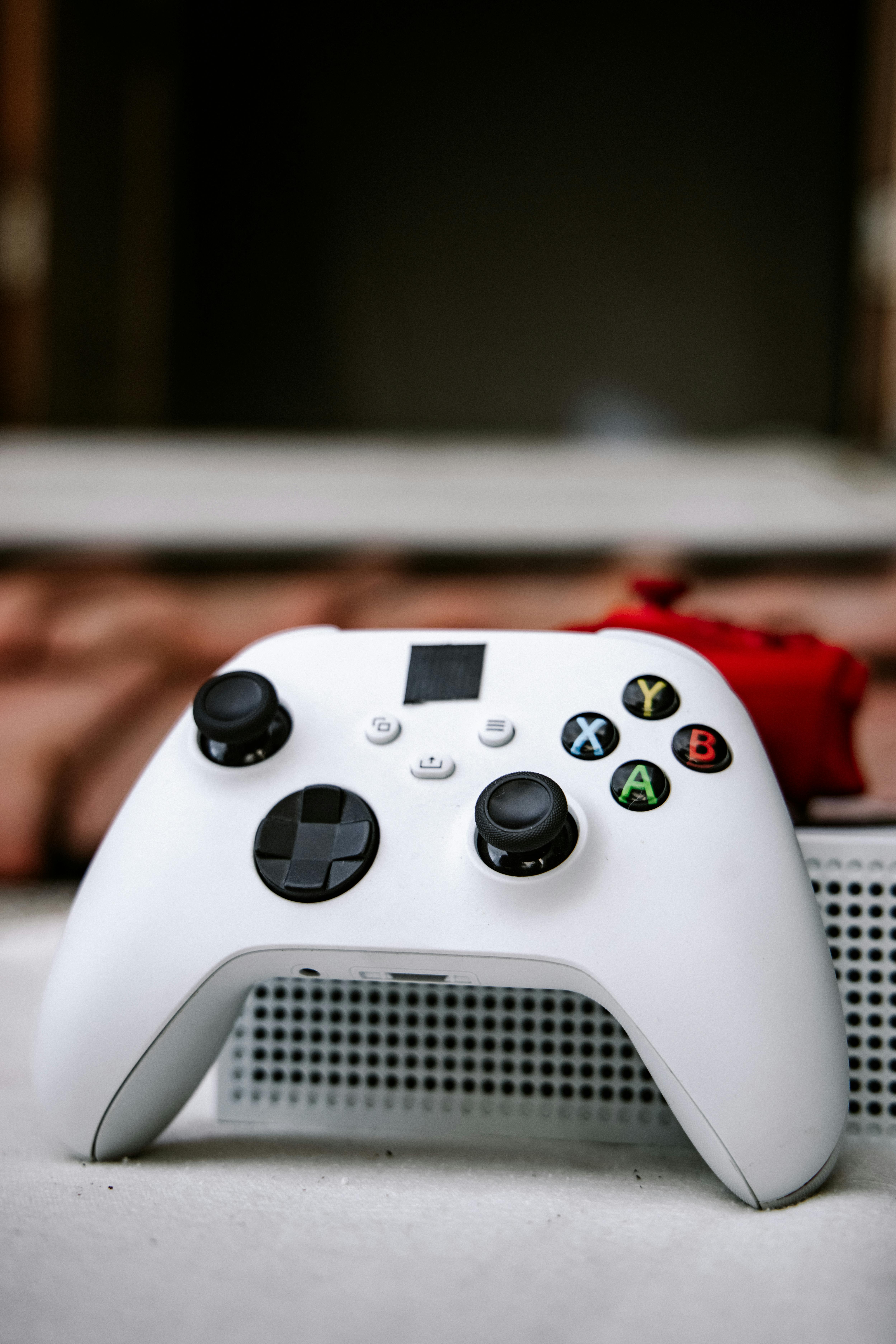 Close-up of a White Game Controller · Free Stock Photo