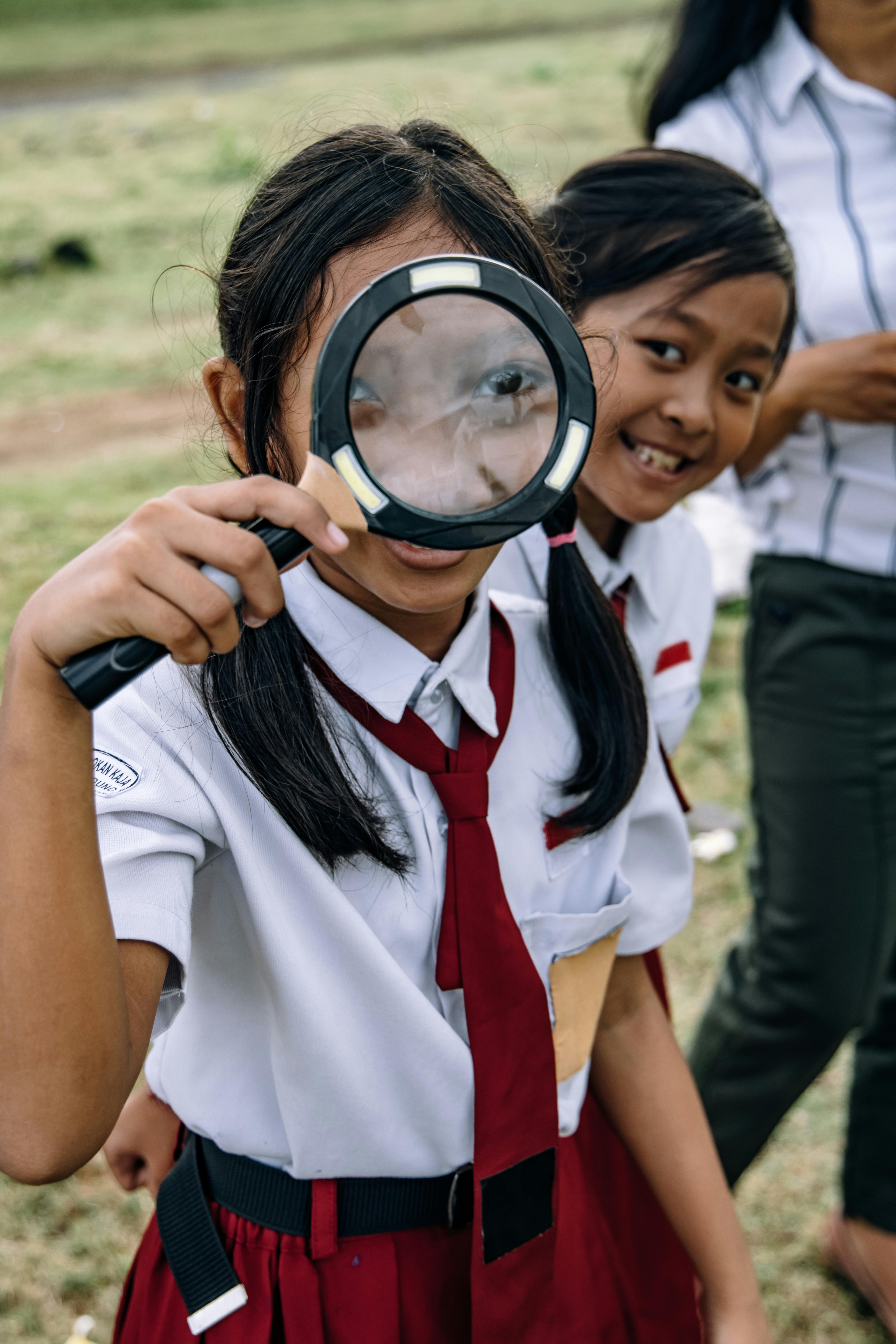 Girl in School Uniform Throwing Her Backpack · Free Stock Photo