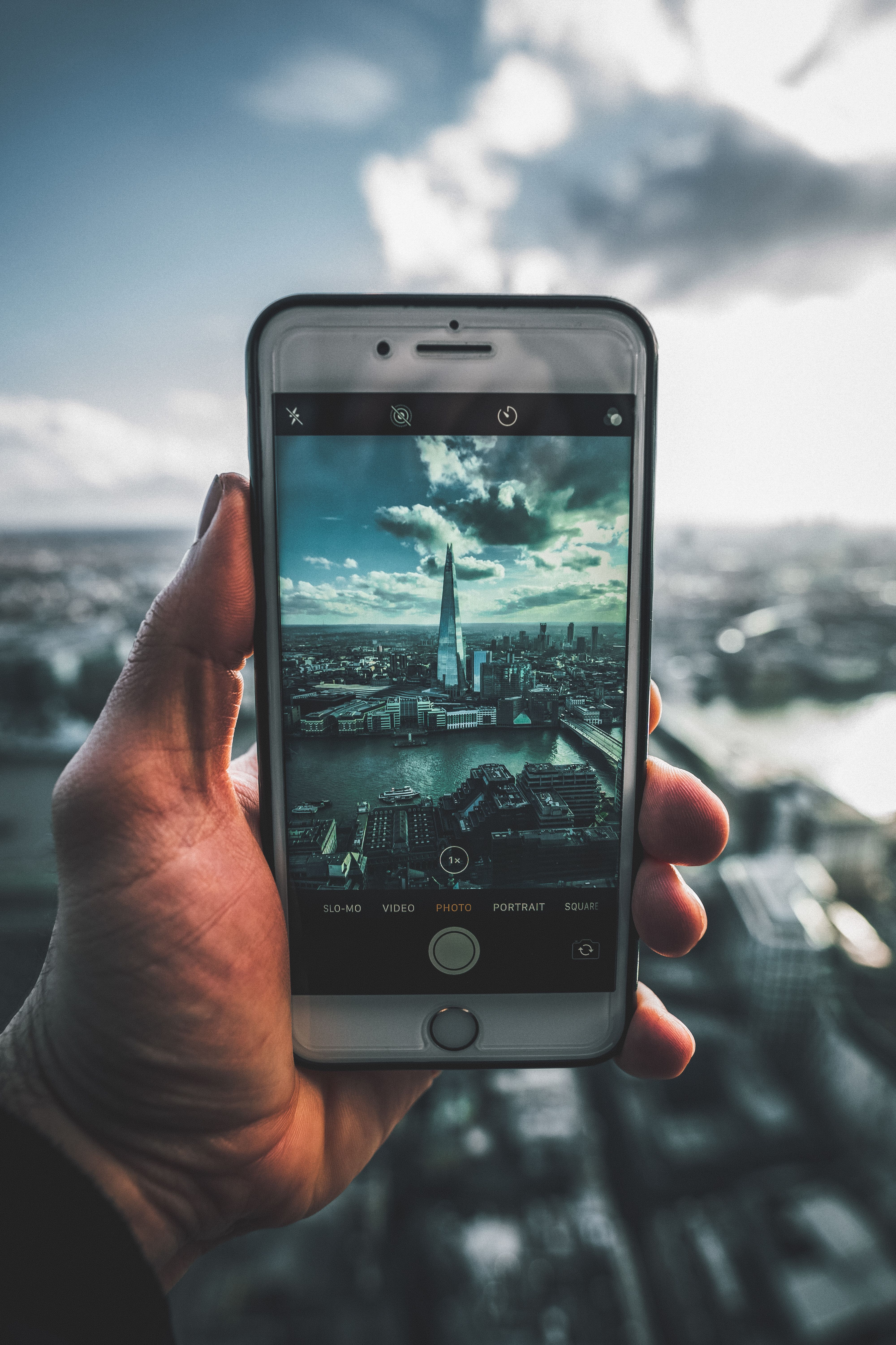 Person Holding a Smartphone Taking a Picture · Free Stock Photo