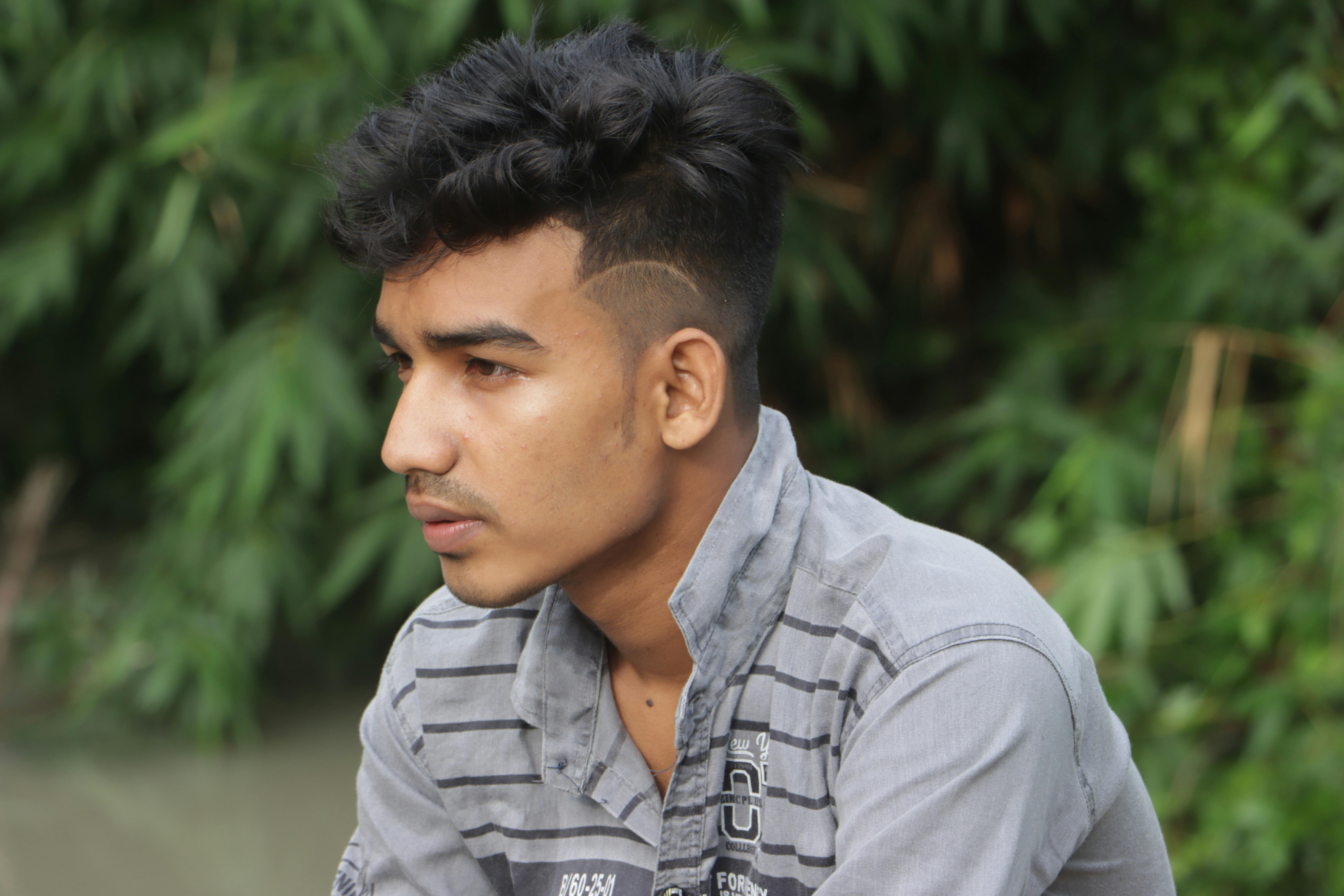 Man Leaning On Wall · Free Stock Photo