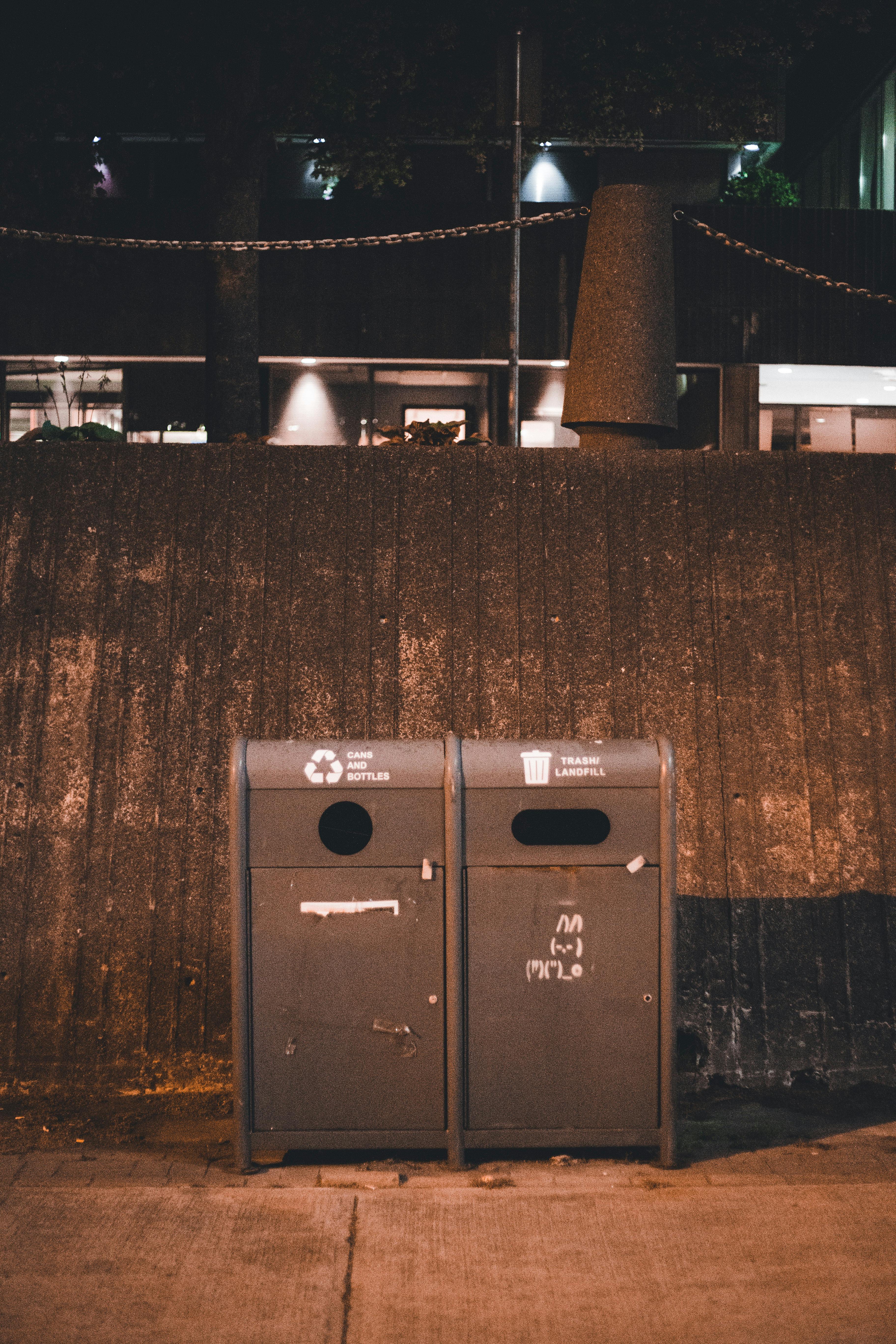 Dirty Rusty Garbage Can on Street Sidewalk · Free Stock Photo