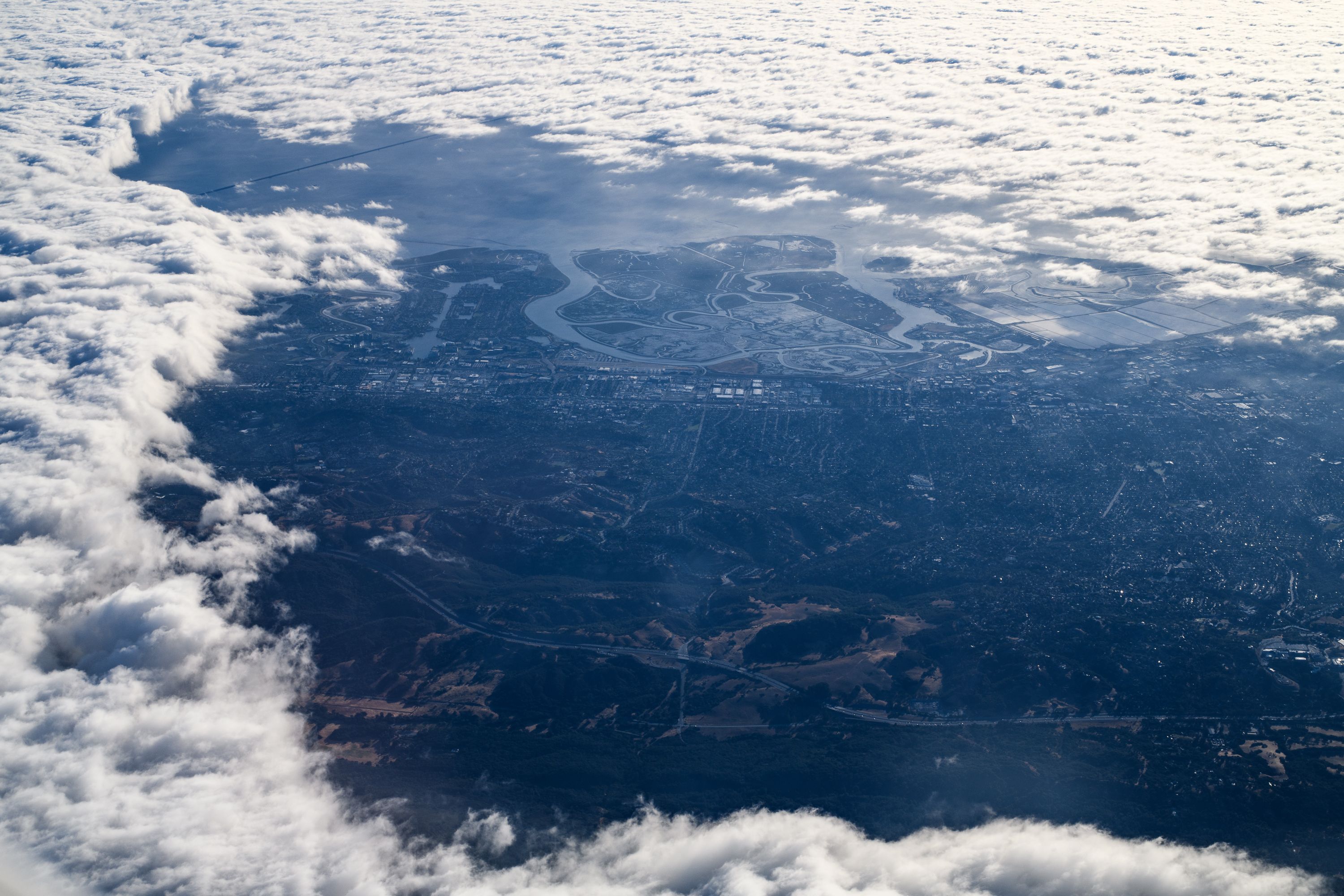 Aerial View of Cloud Formations over Land · Free Stock Photo