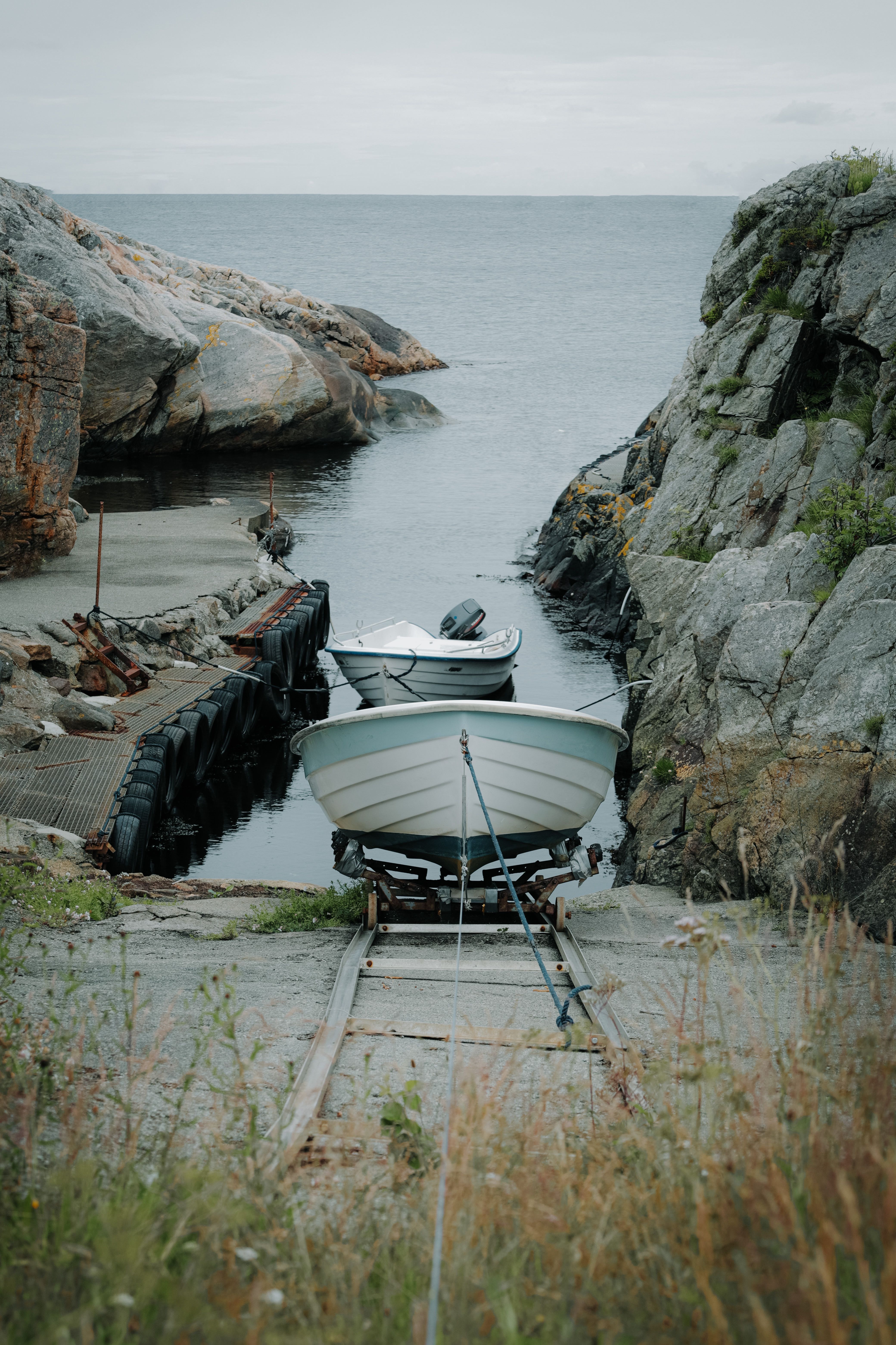 Boat Docked on Sea Shore · Free Stock Photo