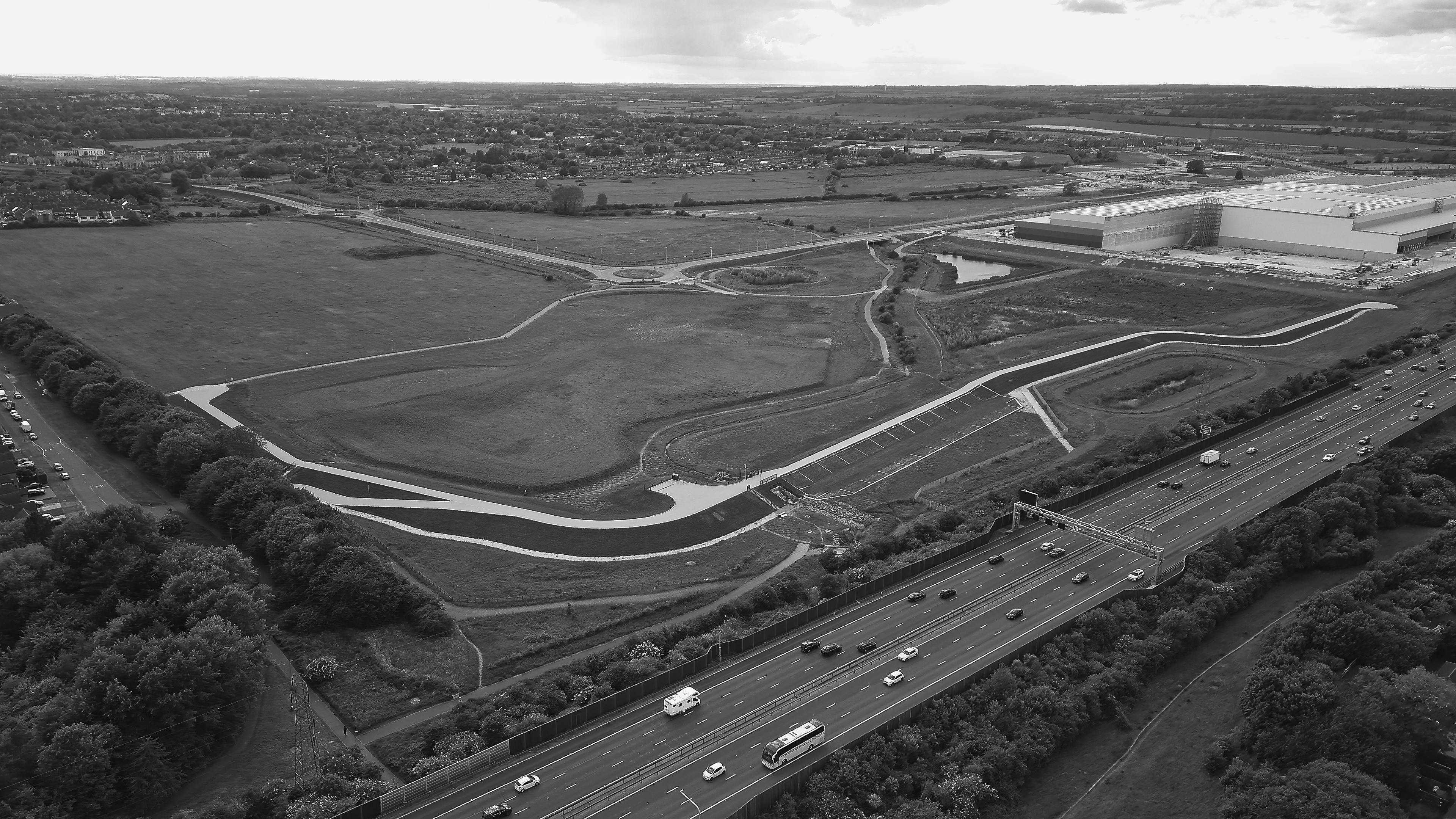 Black and White Aerial Photography of a Landscape with a Highway and a ...