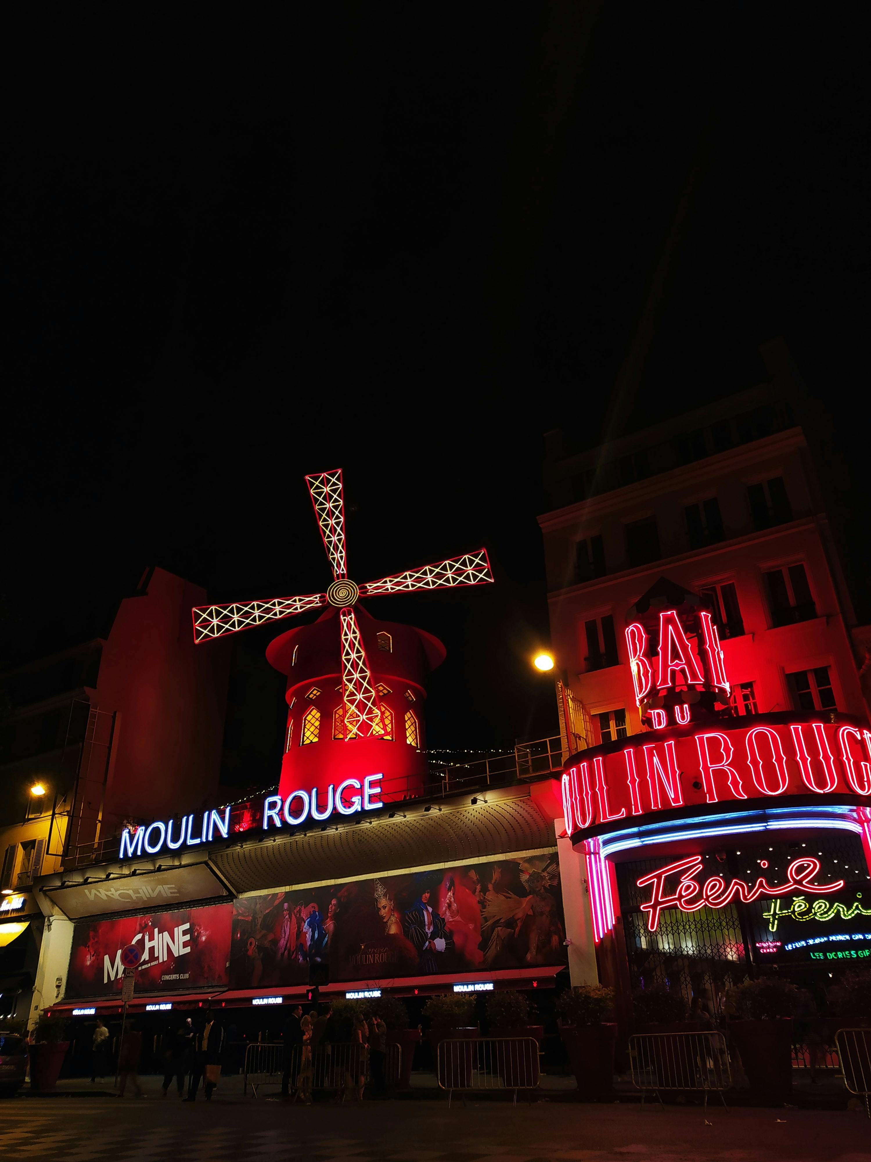 Moulin Rouge in Paris Illuminated at Night · Free Stock Photo