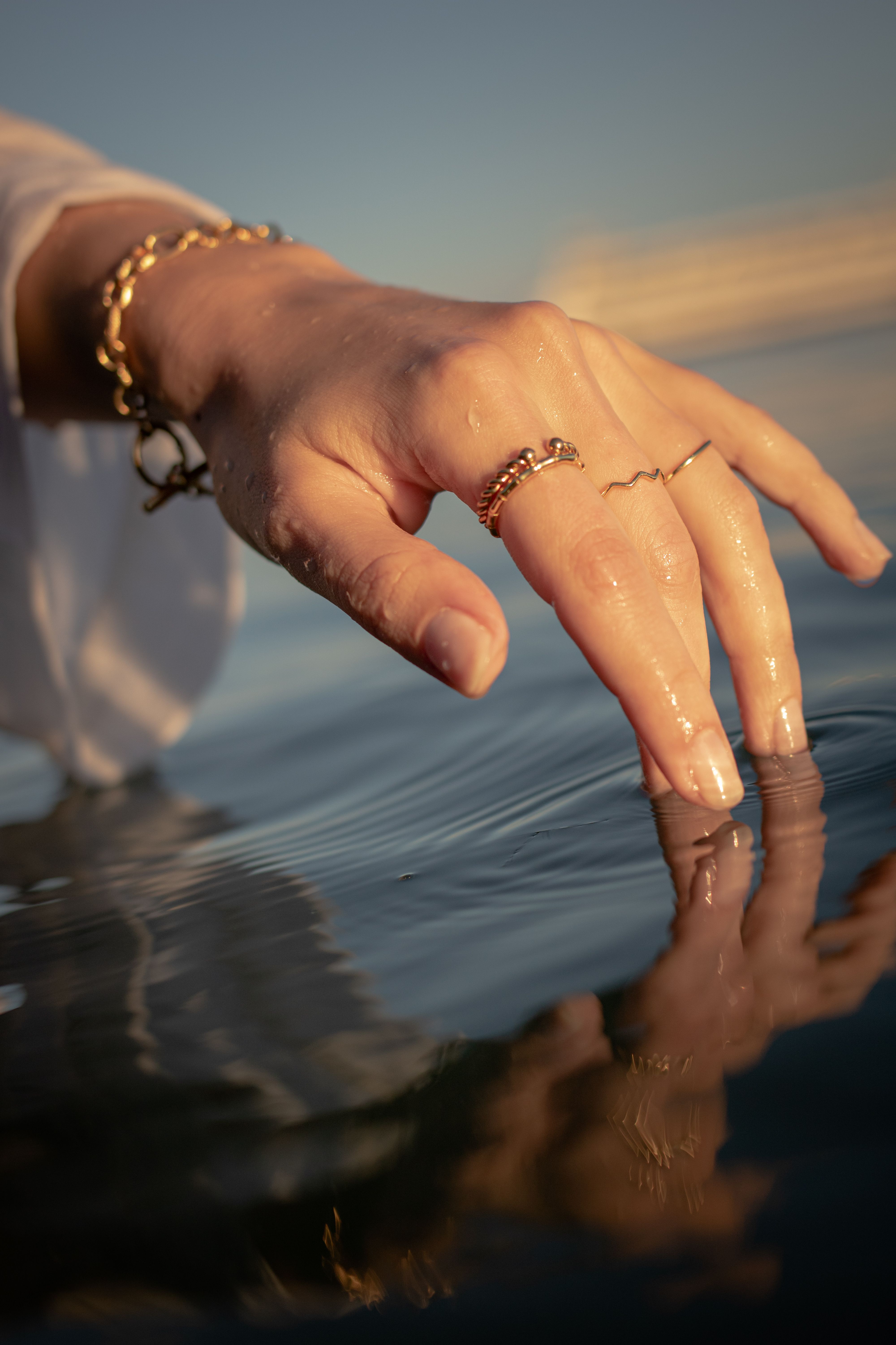 Close up of a Woman Touching Water · Free Stock Photo