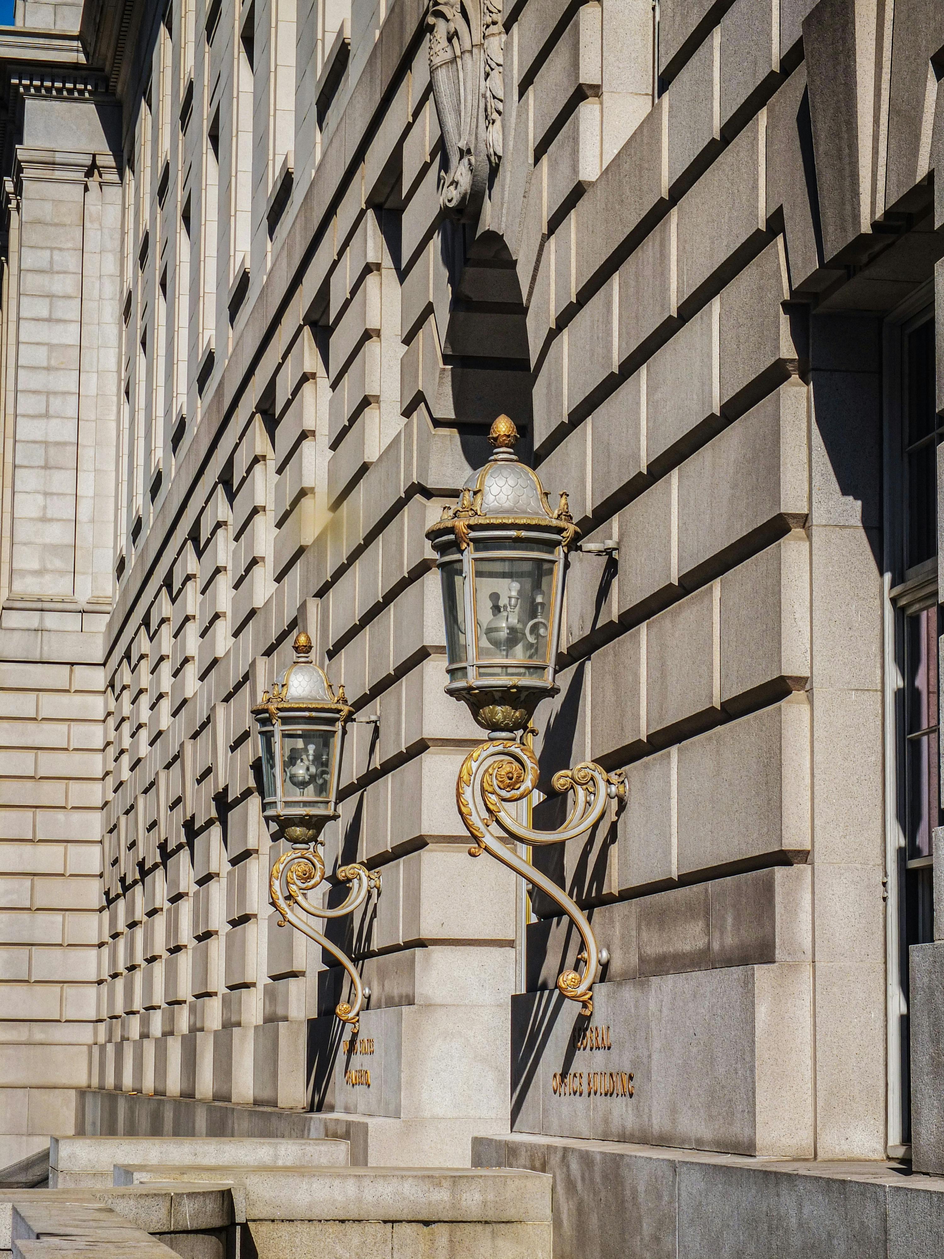 Antique Lanterns on the Facade of a Palace · Free Stock Photo