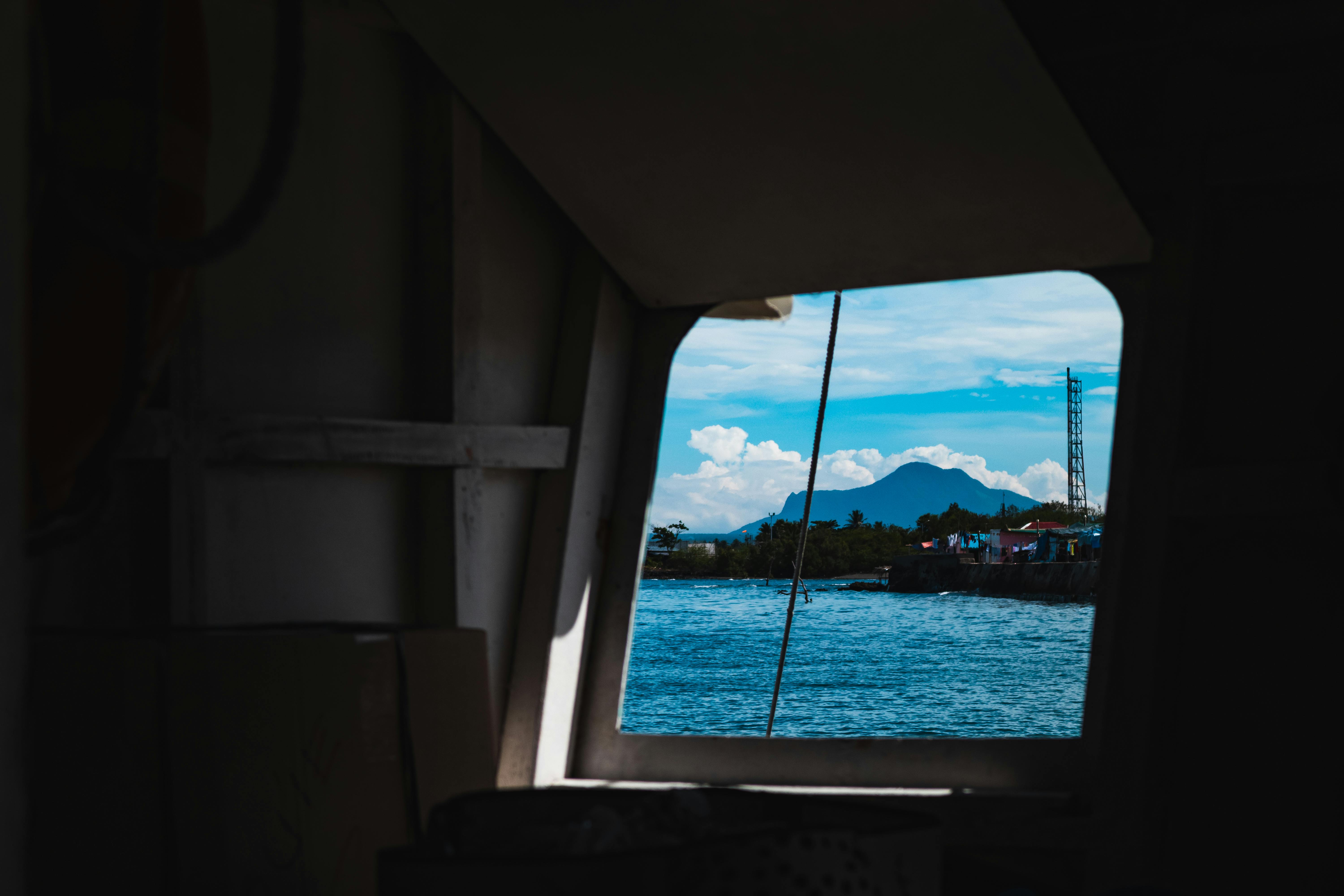 Sea behind Window · Free Stock Photo