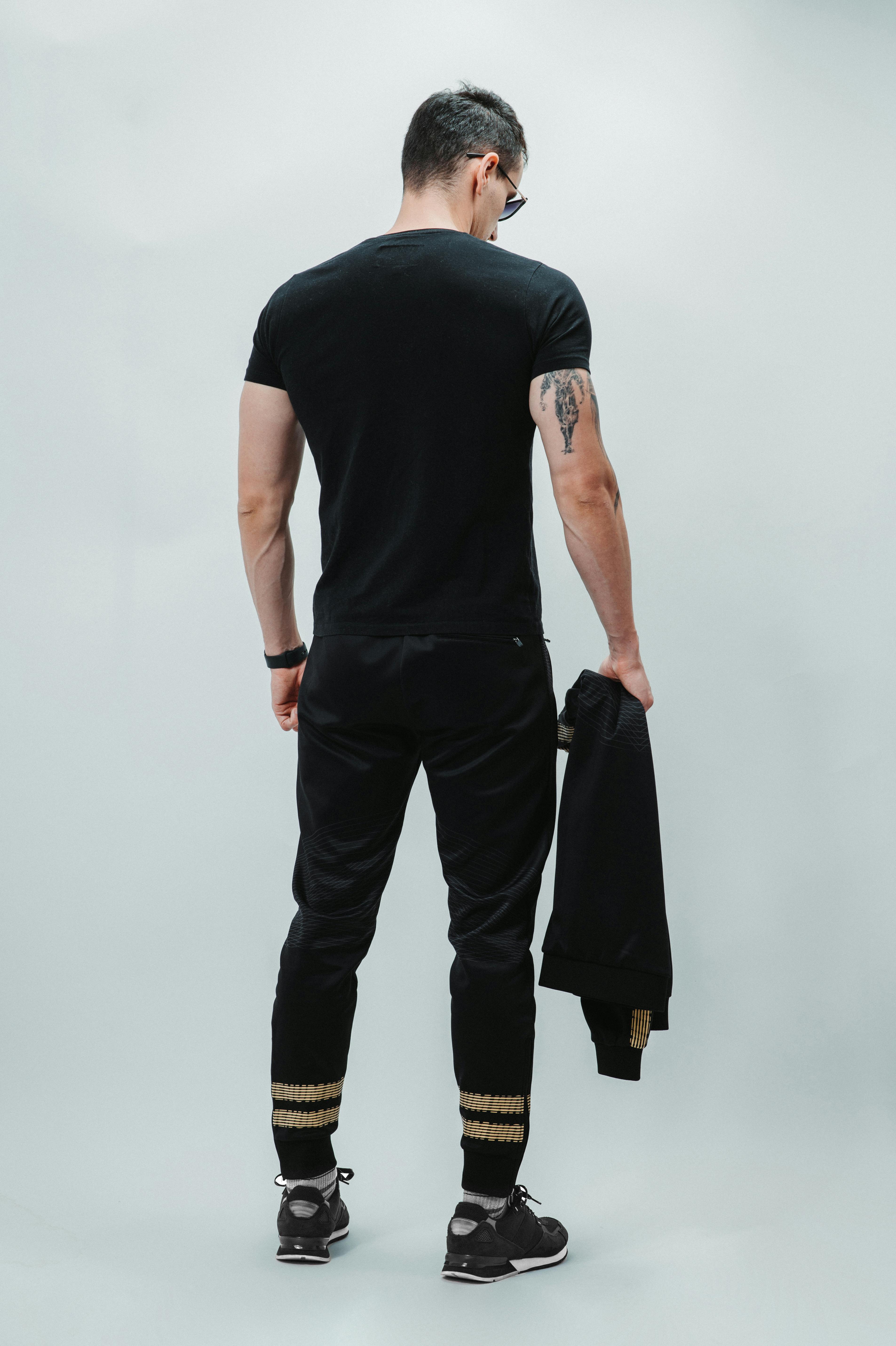 Backview of Man in Black Clothing · Free Stock Photo