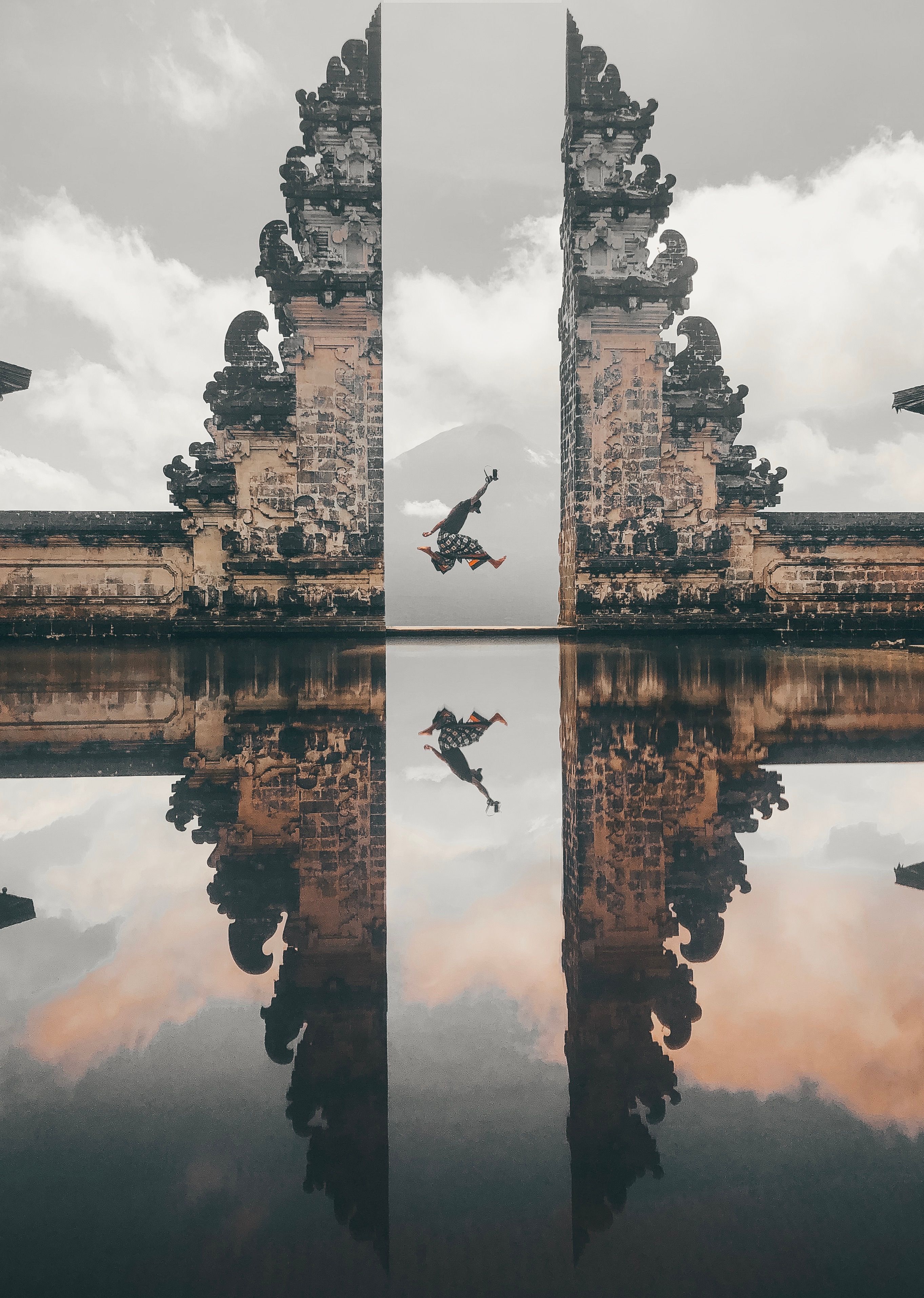 Reflection of Person Jumping between Walls · Free Stock Photo