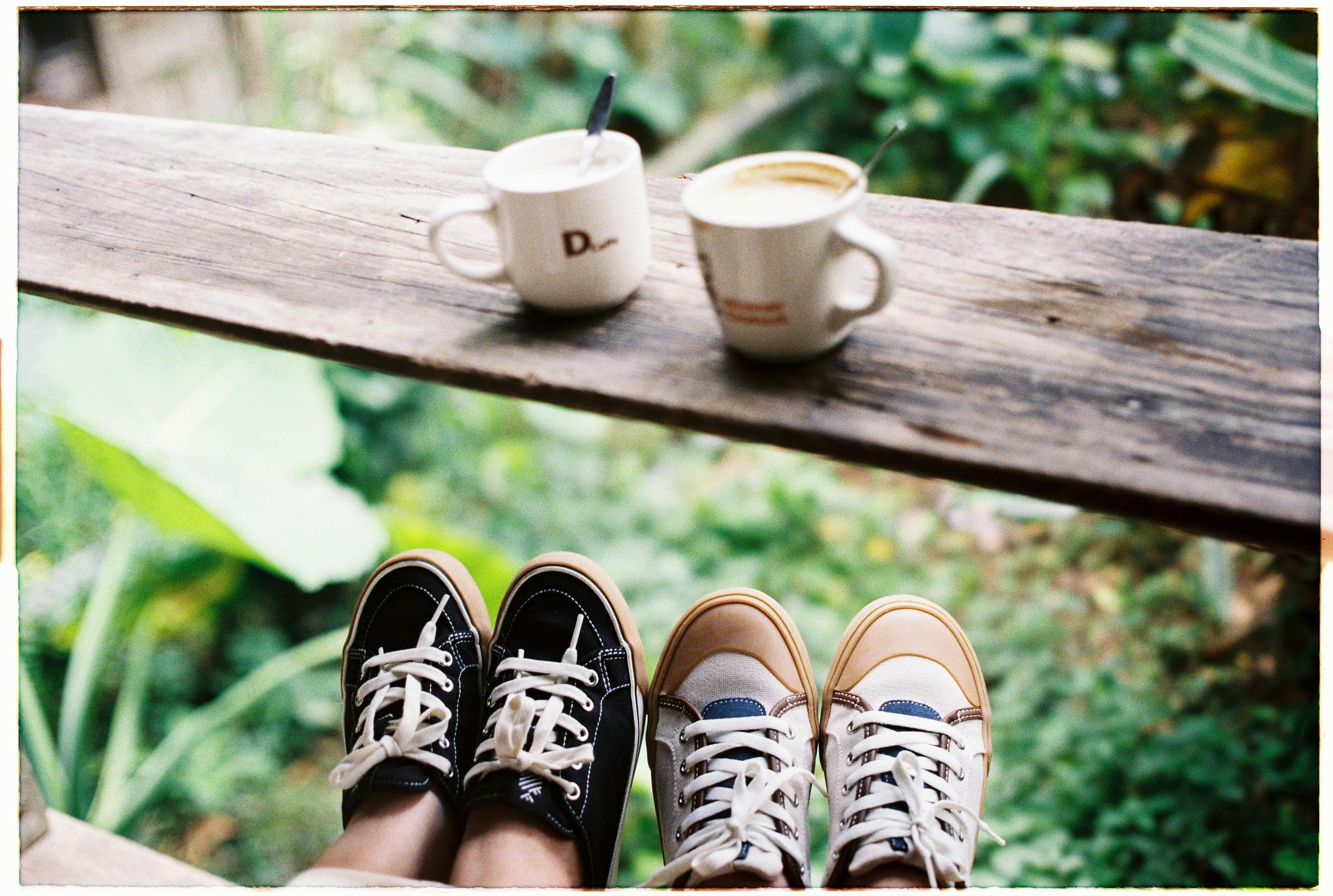 People Sitting Outdoors with Coffee · Free Stock Photo