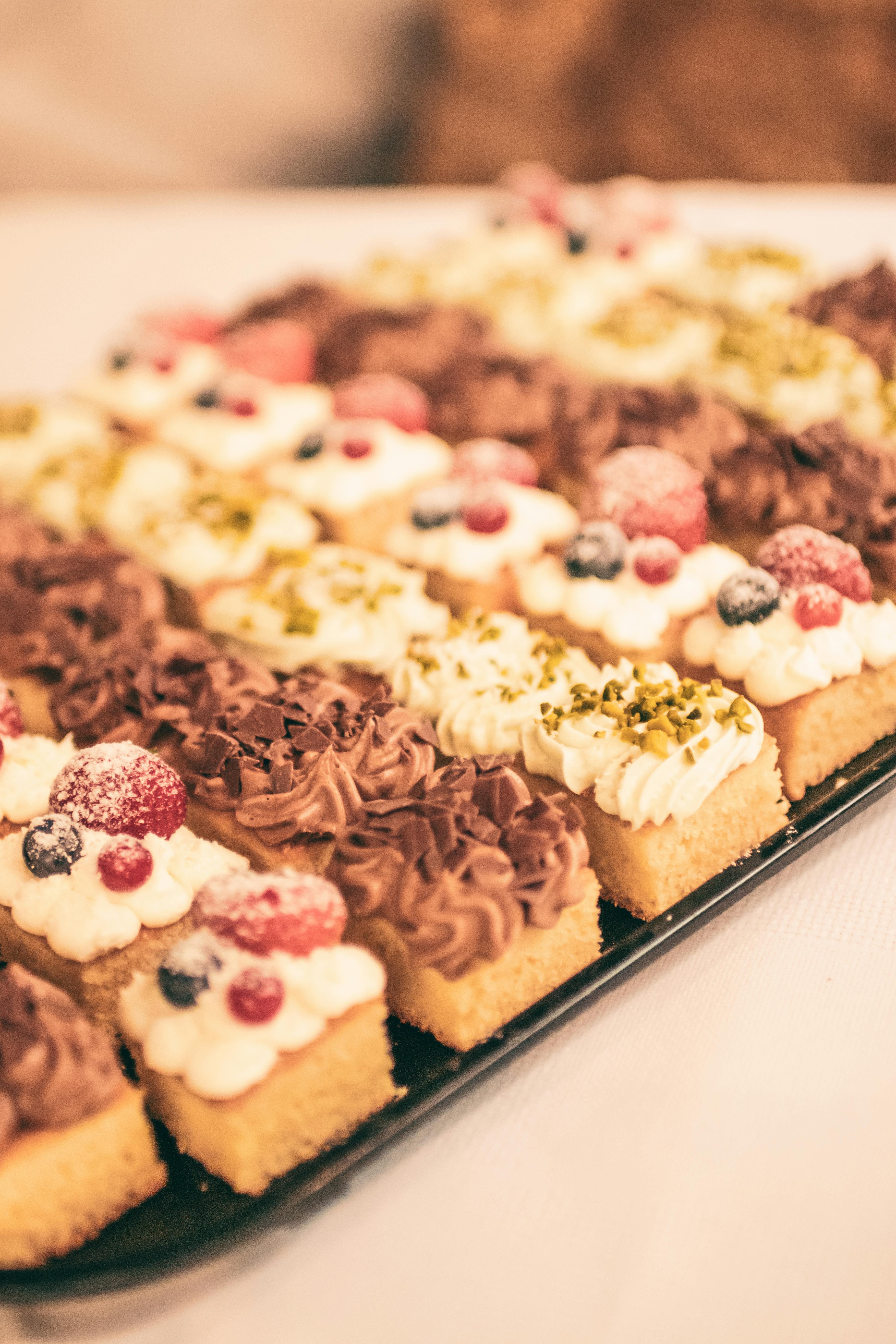 Brownies with Assorted Toppings on the Tray · Free Stock Photo