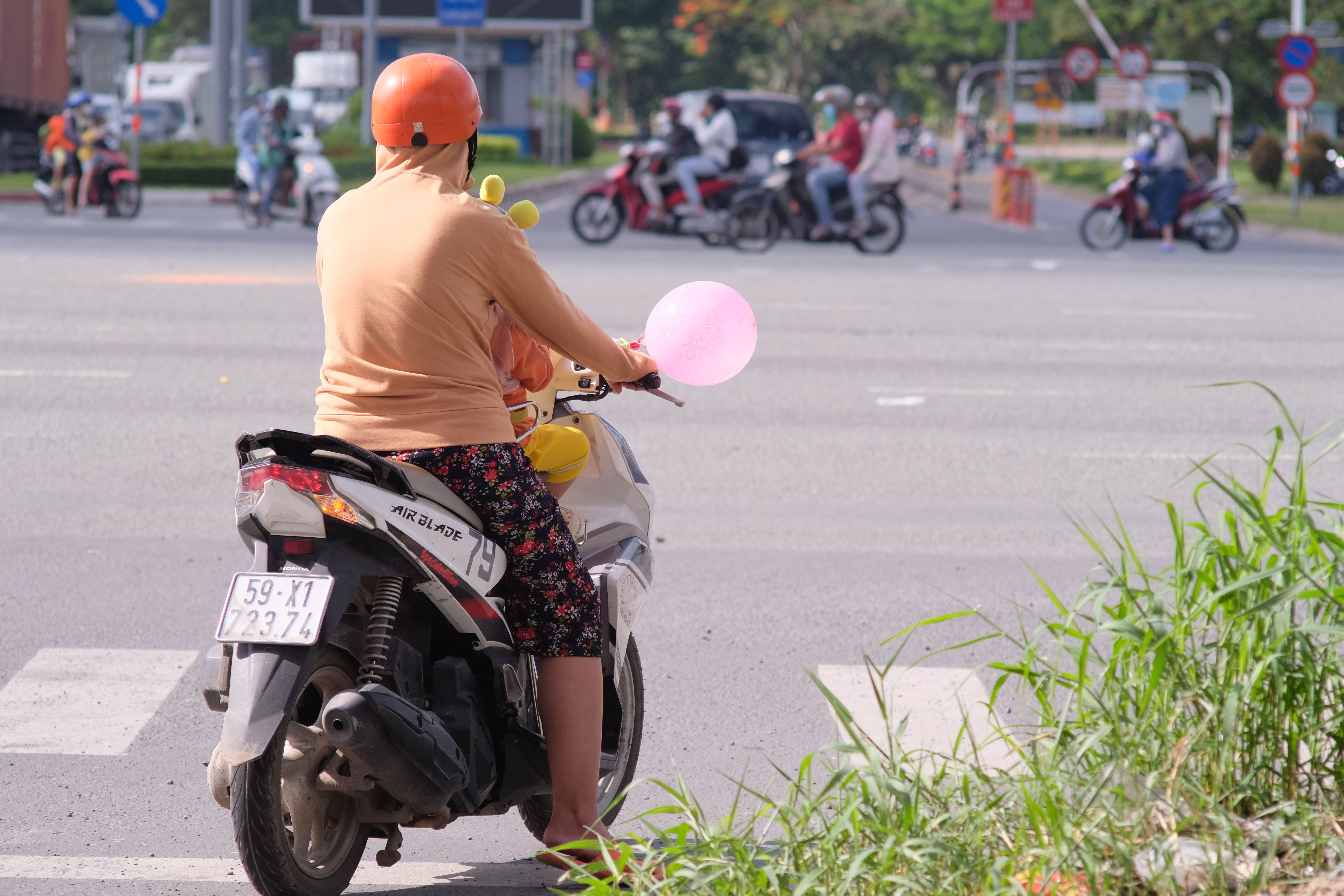 Person Riding Motorbike on Road · Free Stock Photo