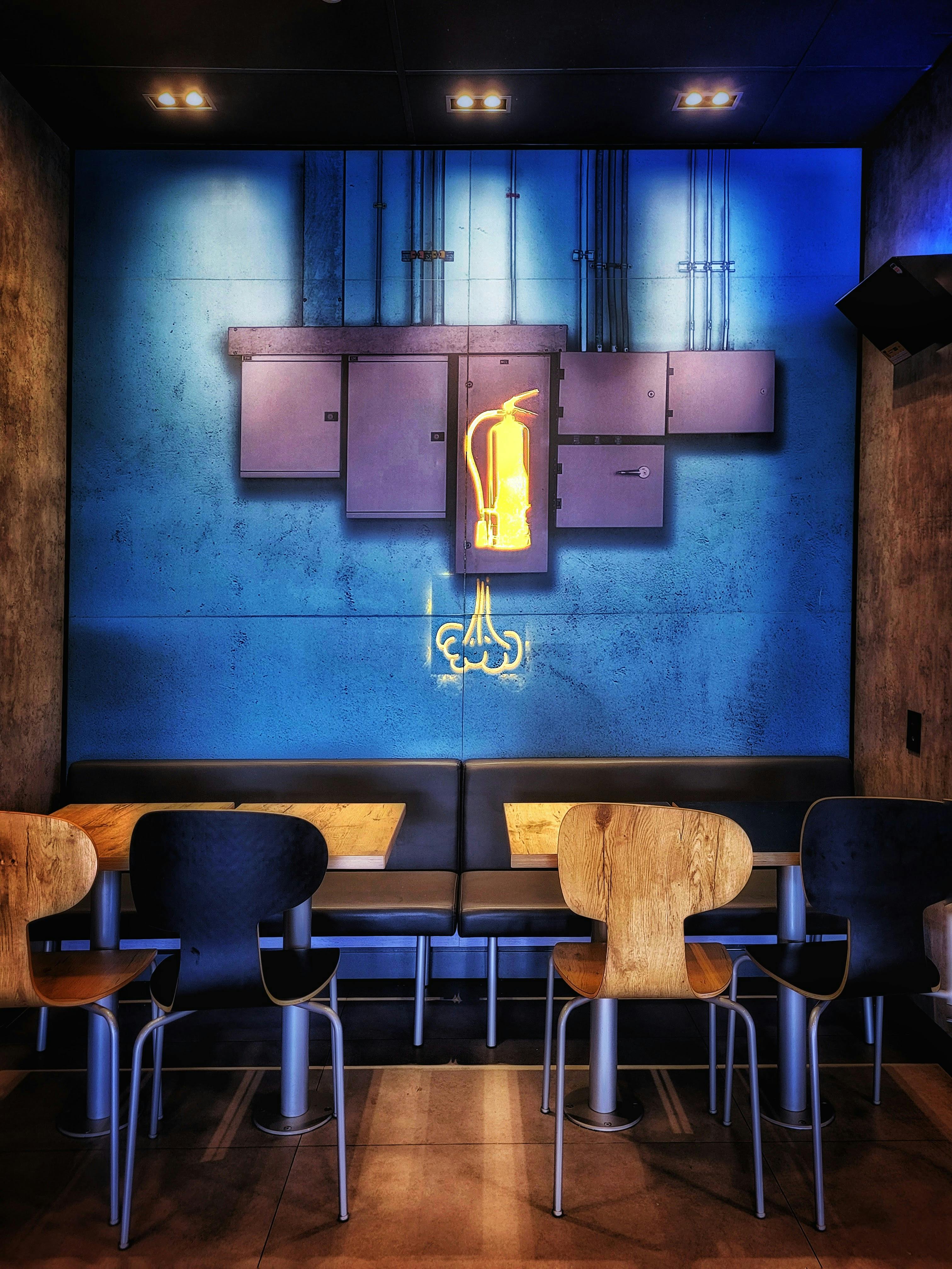 Wooden Tables with Chairs Inside the Restaurant · Free Stock Photo