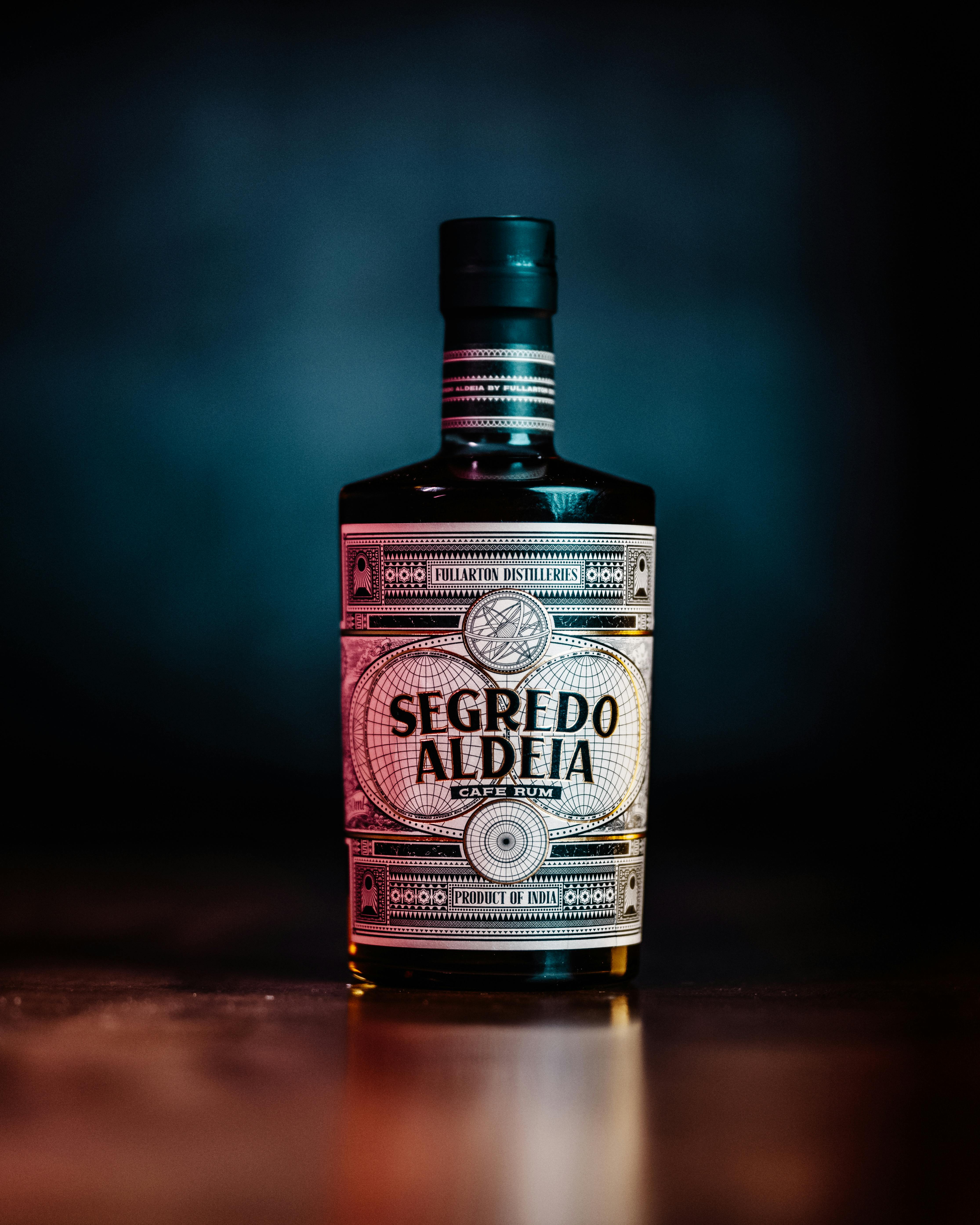 A Bottle of Segredo Aldeia Rum Close-Up Photo · Free Stock Photo